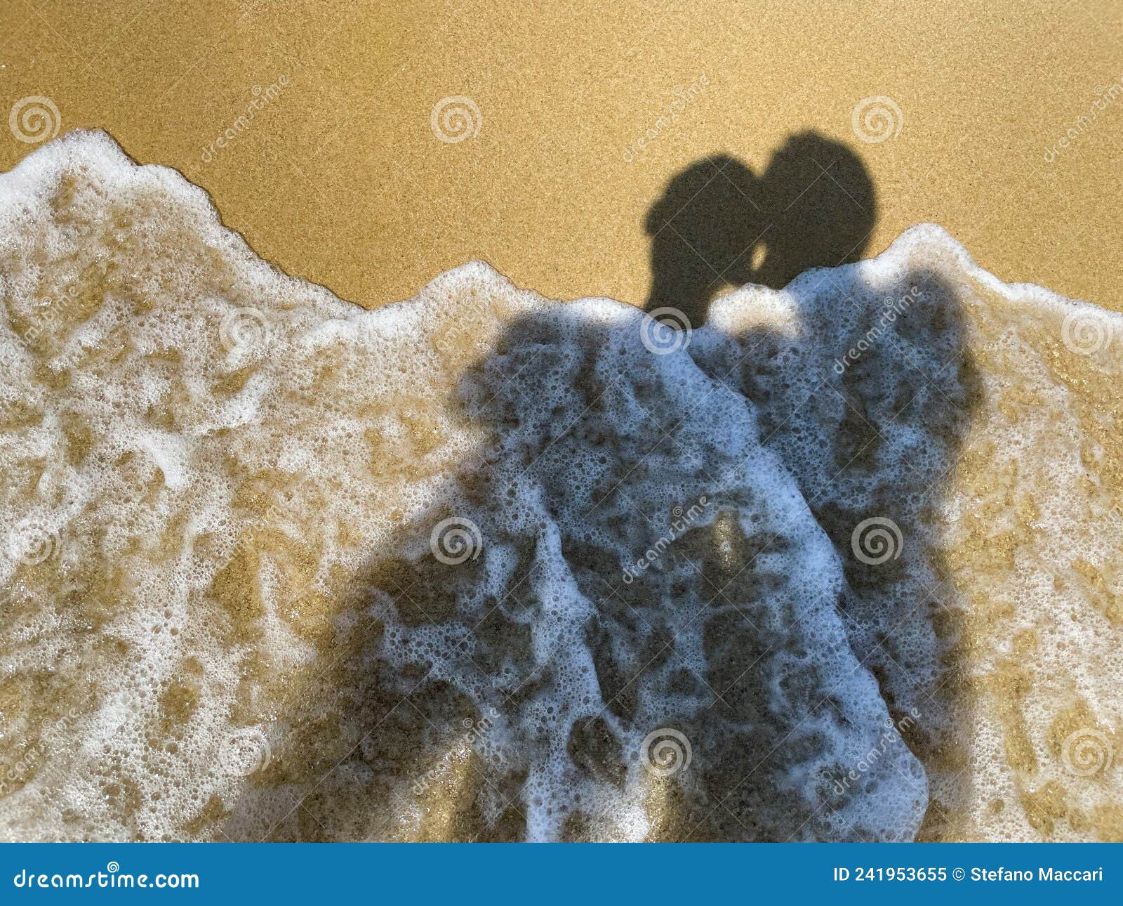 Shadow of a Couple on the Sand Stock Image - Image of coast, sand ...