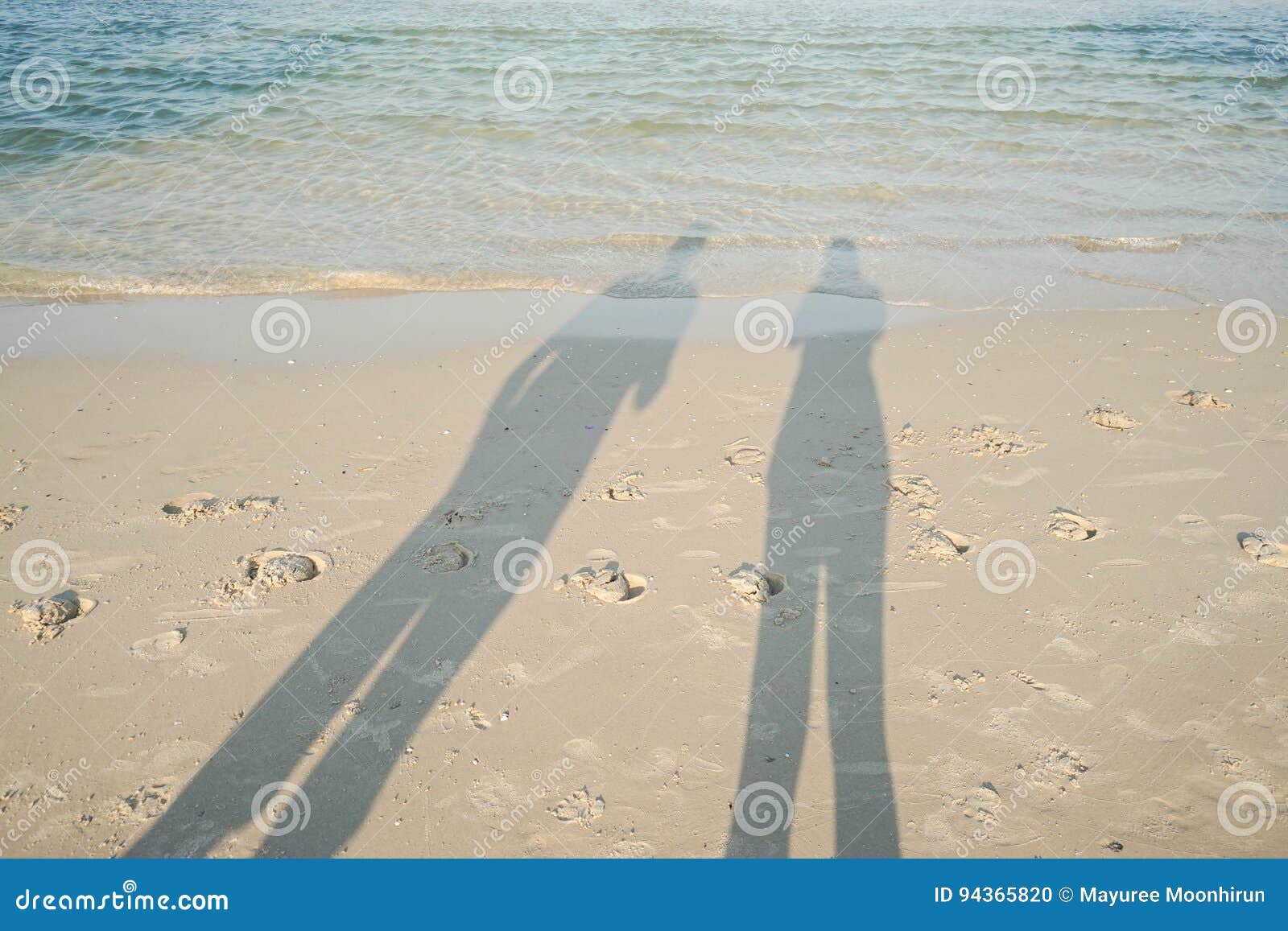 Shadow On The Seaside Sand: A Harmony Of Light, Waves, And Natural ...