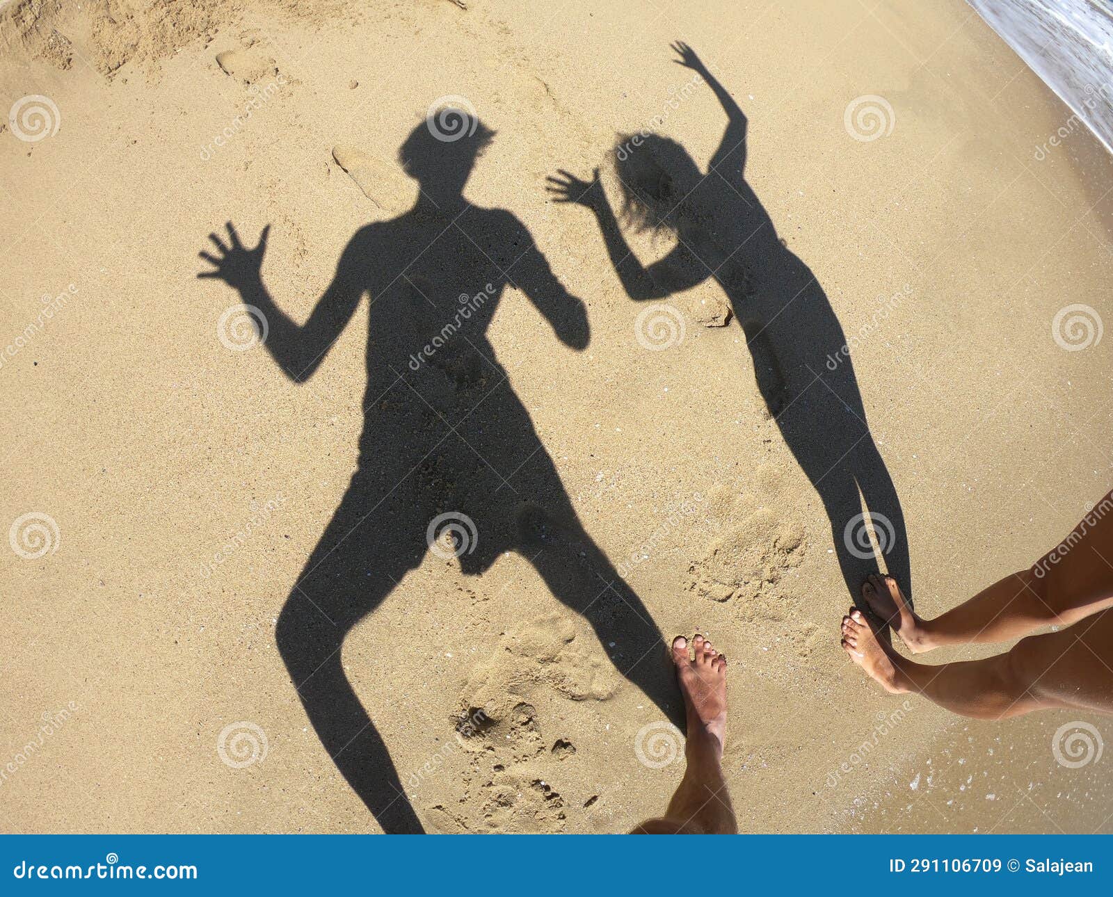 Shadow of a Couple on a Sandy Beach Stock Image - Image of coast ...
