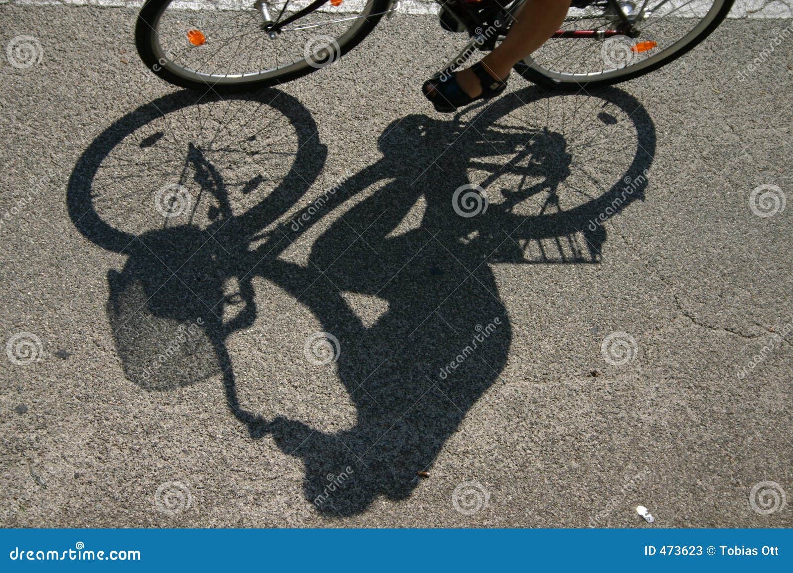 The shadow of a cyclist stock image. Image of wheel, cycle - 473623