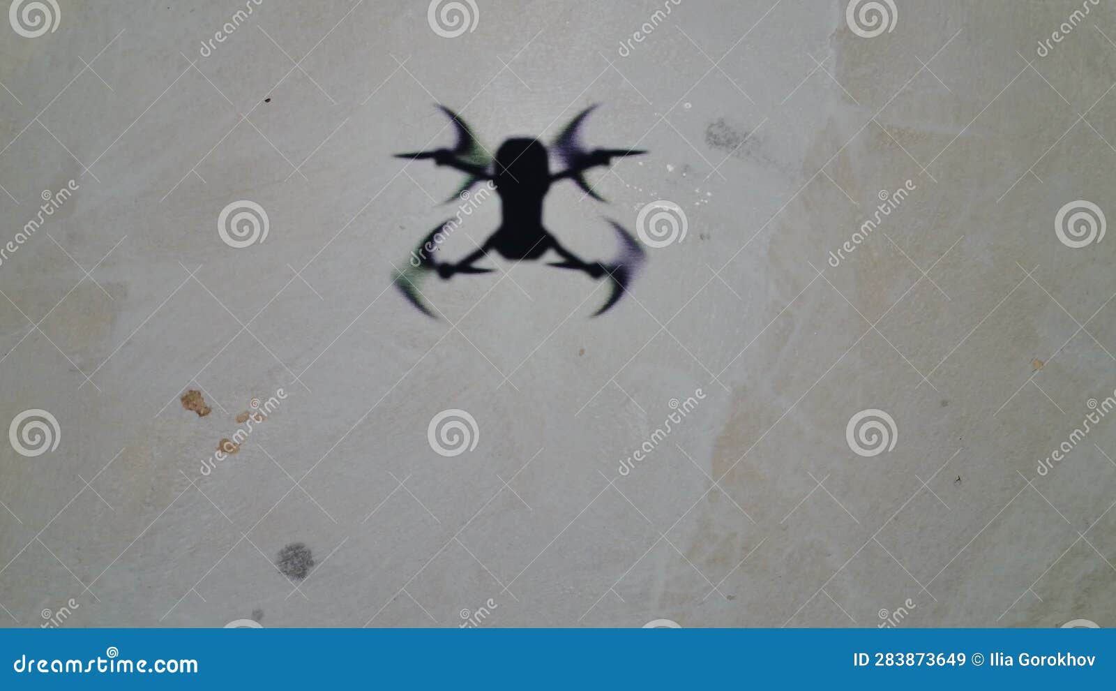 Shadow of Drone Flying. Quadcopter Shadow Low Flying on Asphalt Ground ...