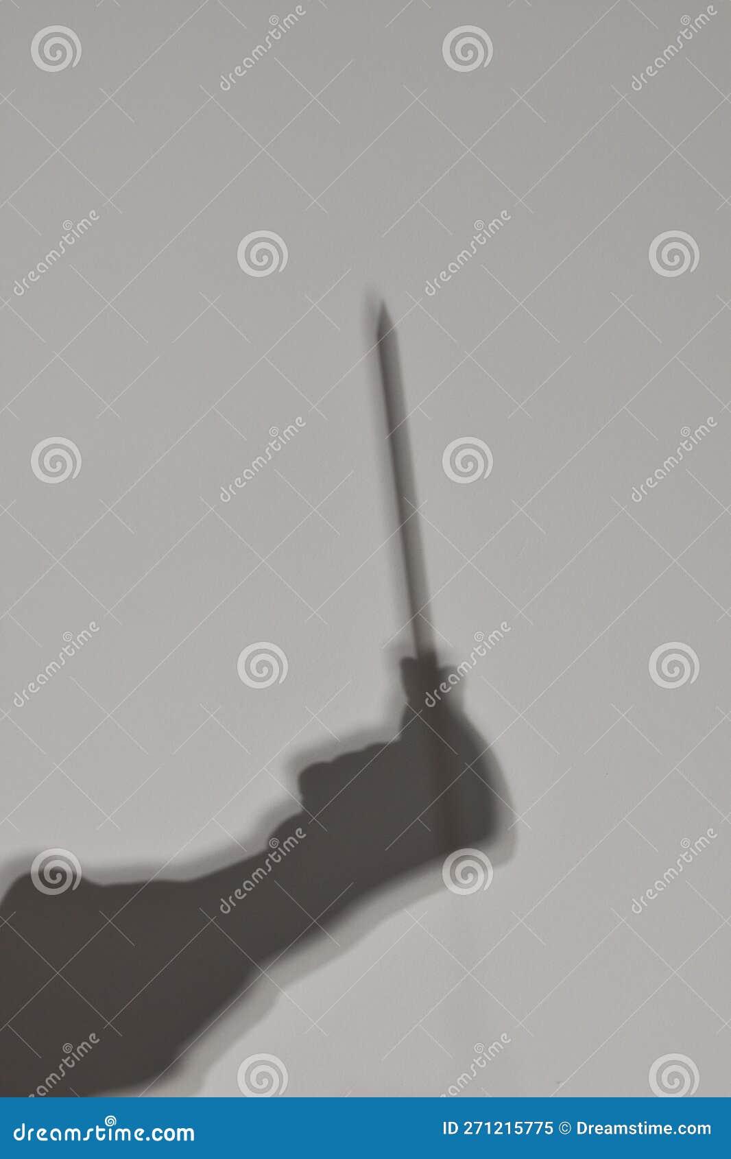 Shadow of the Female Hand Holding a Pencil , Sign on the Light Wall ...