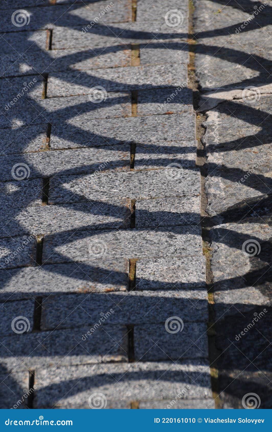 The Shadow of the Figured Parapet on the Stone Pavement Stock Photo ...