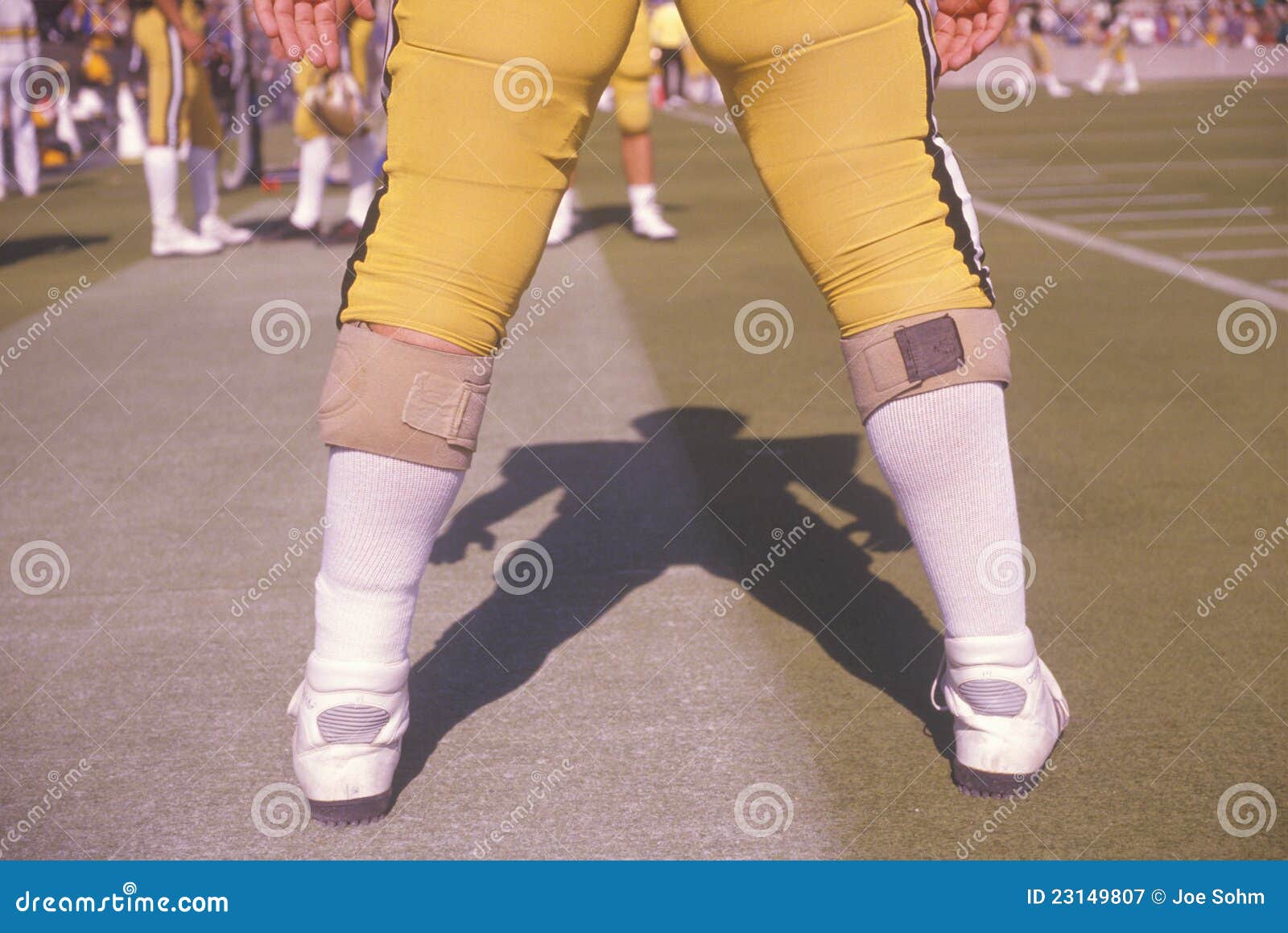 Shadow of football player editorial photography. Image of football ...