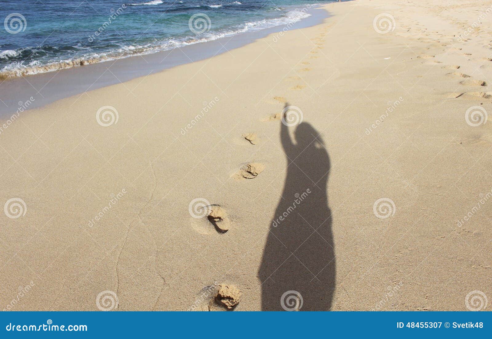 Shadow and Footprints on a Beach Stock Image - Image of beach ...