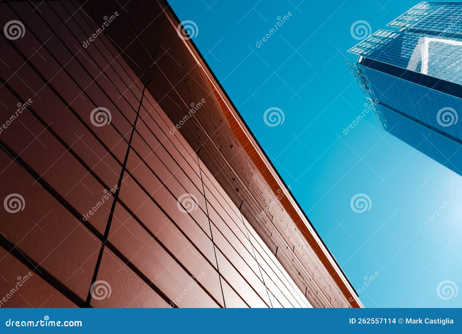 Shadow Forms Clean Gradient on Red Tiles and Tall Buildings with Clear ...