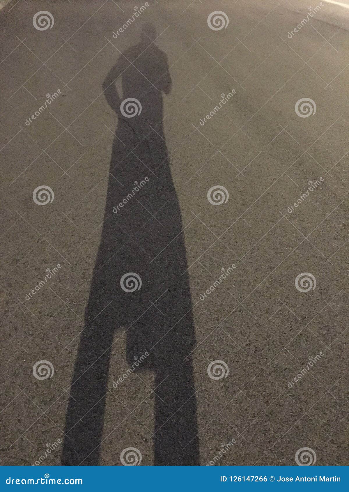 Shadow of a giant stock photo. Image of light, dark - 126147266