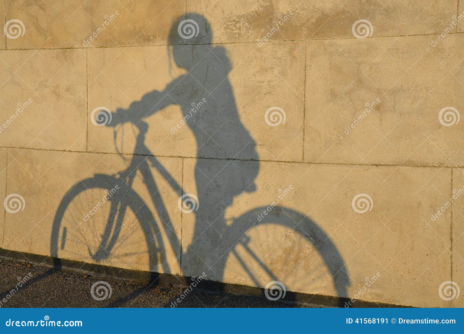 Shadow of girl on bicycle stock image. Image of shadow - 41568191