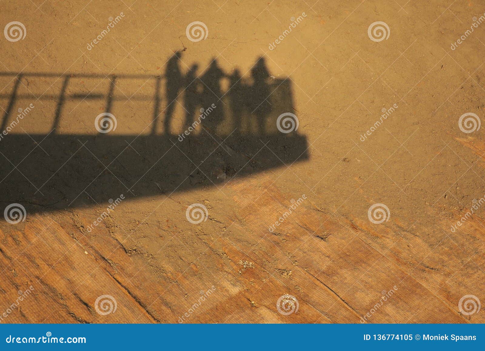 Shadow of a Group of People Standing on a an Observation Post Near a ...