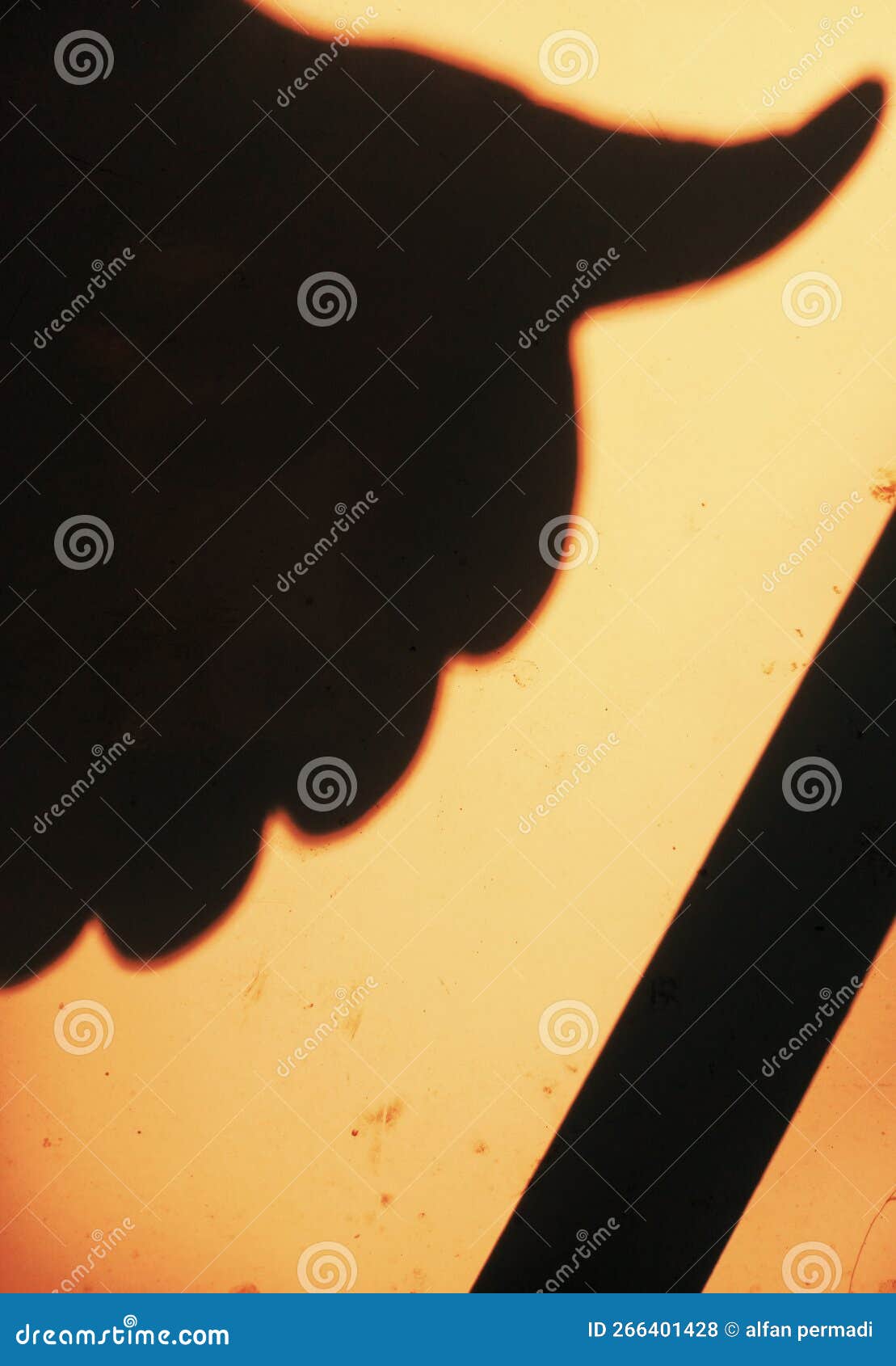 The Shadow of the Hand Clenching the Thumb Raised Stock Photo - Image ...