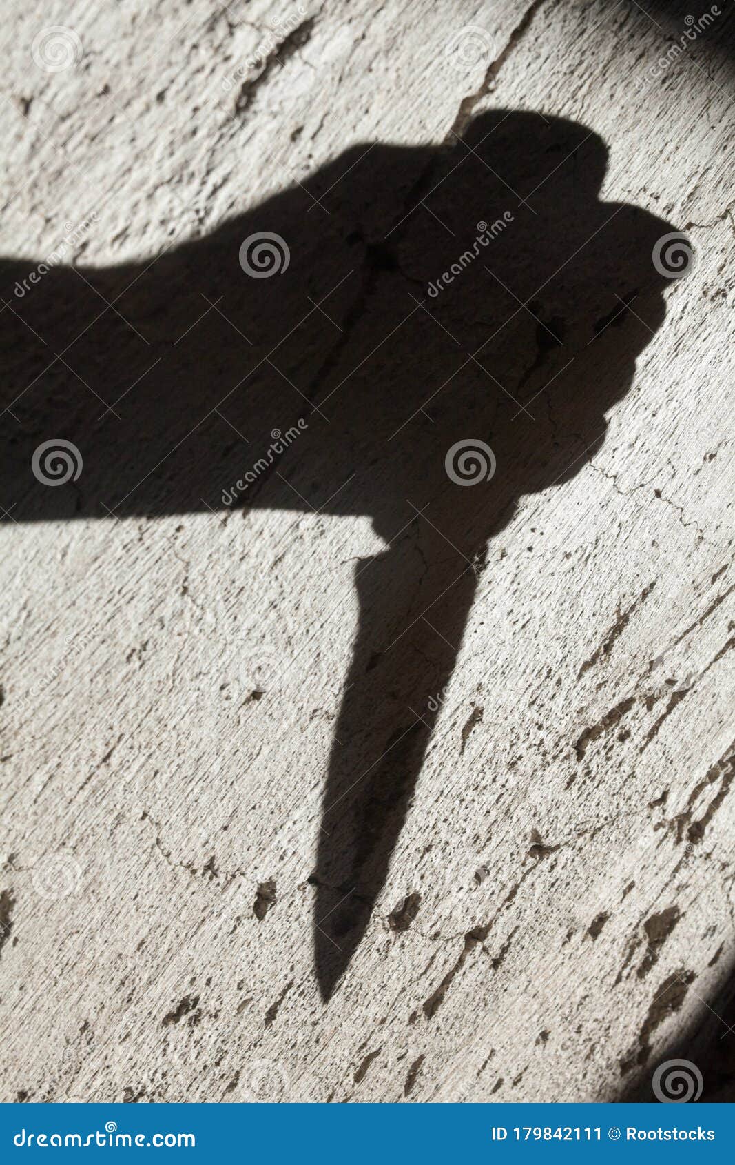 Shadow of the Hand Holding a Knife Stock Image - Image of murder ...