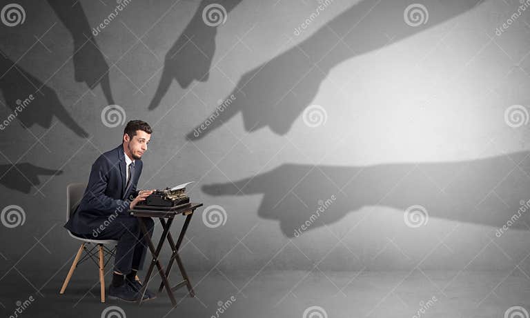 Shadow Hands Pointing at a Small Worker Stock Image - Image of article ...