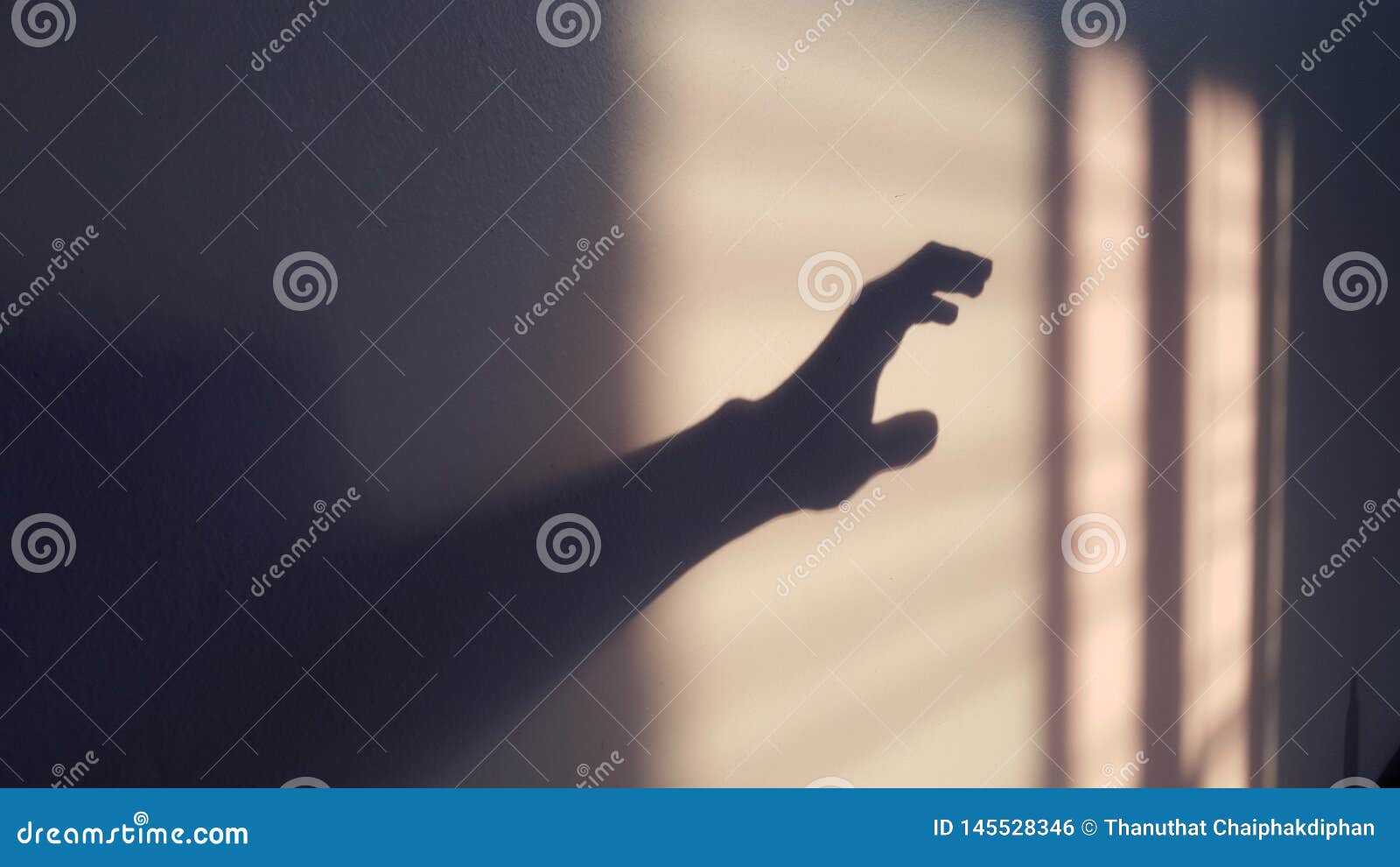 Shadow of hand reach out stock photo. Image of evening - 145528346