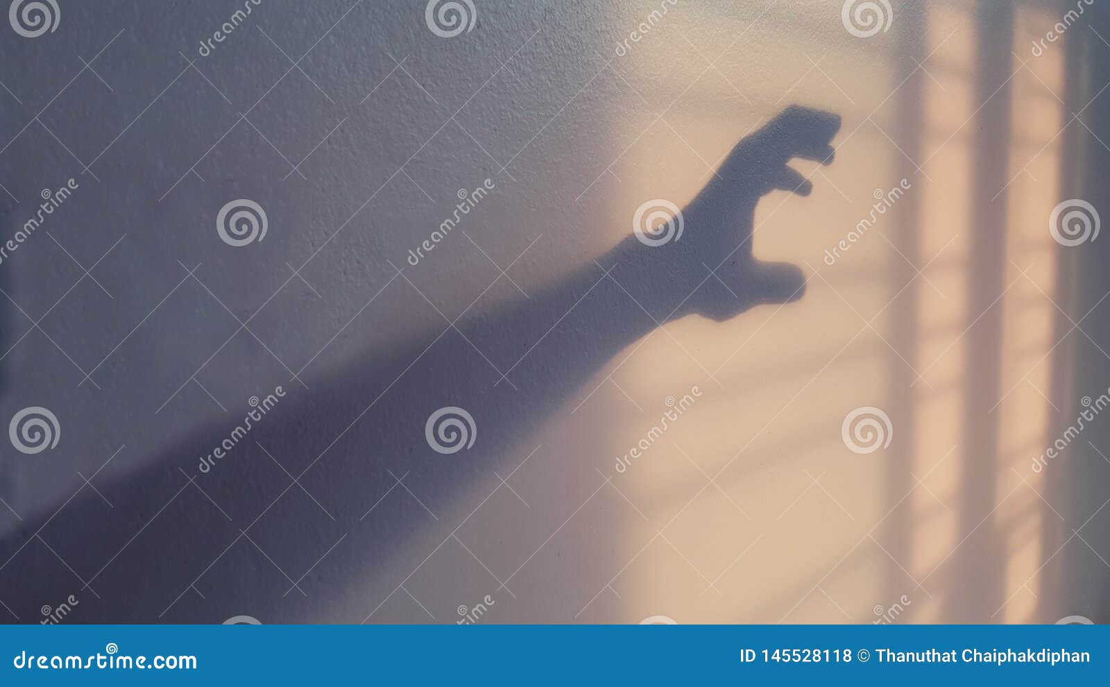 Shadow of hand reach out stock photo. Image of light - 145528118