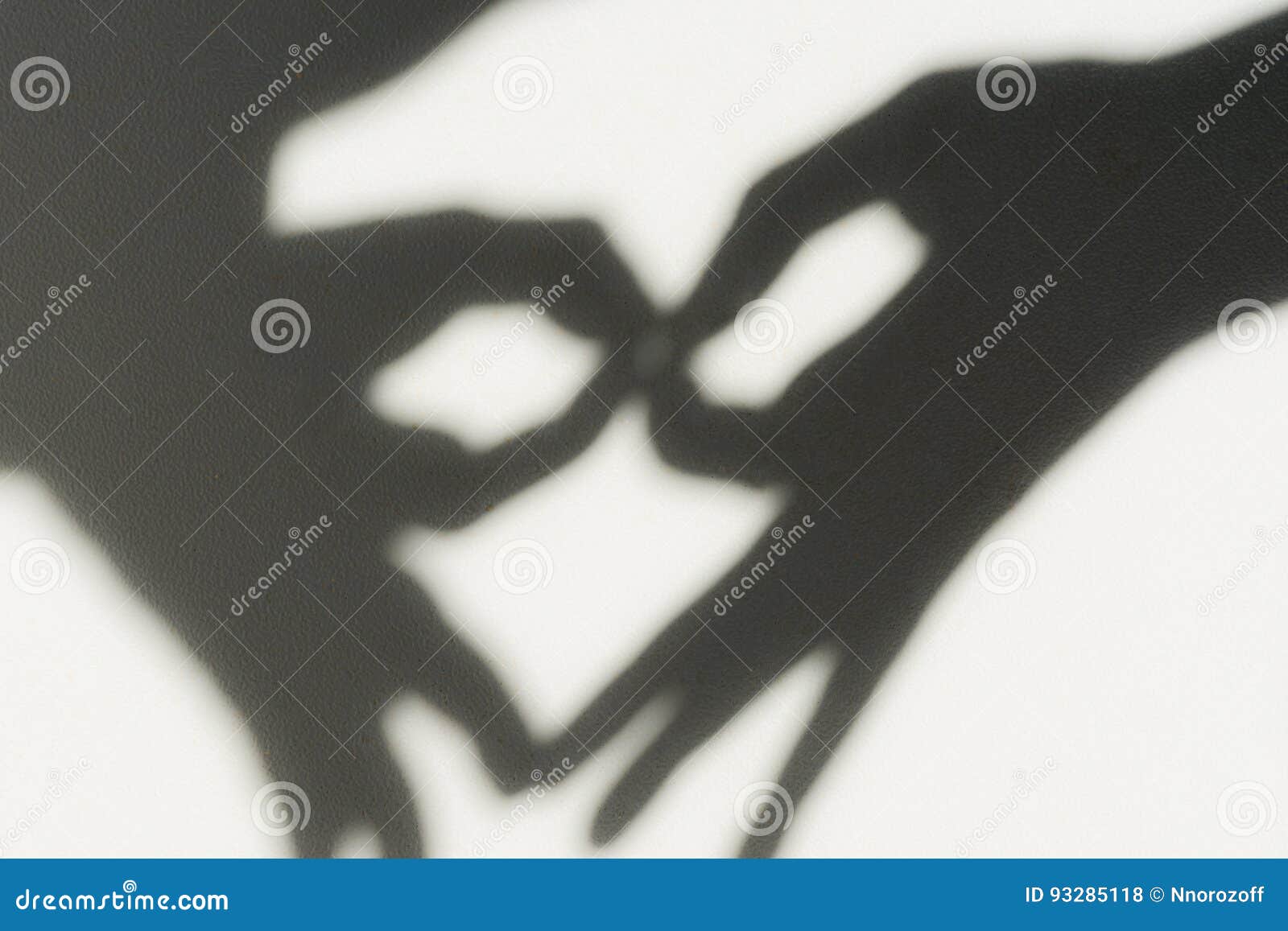 Shadow of the Hands on the Wall Shows a Ghost Stock Photo - Image of ...