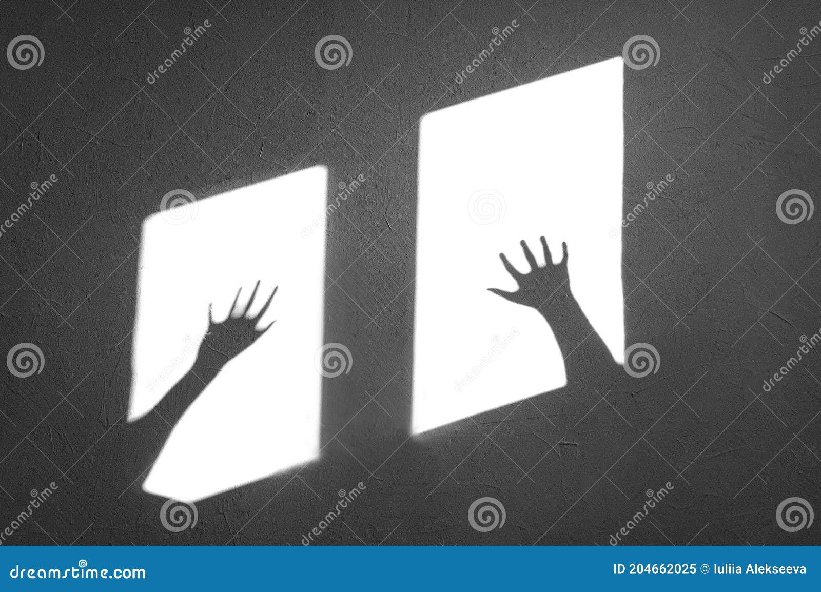 Shadow of Hands and Windows Reflected on Concrete Gray Wall Stock Image ...
