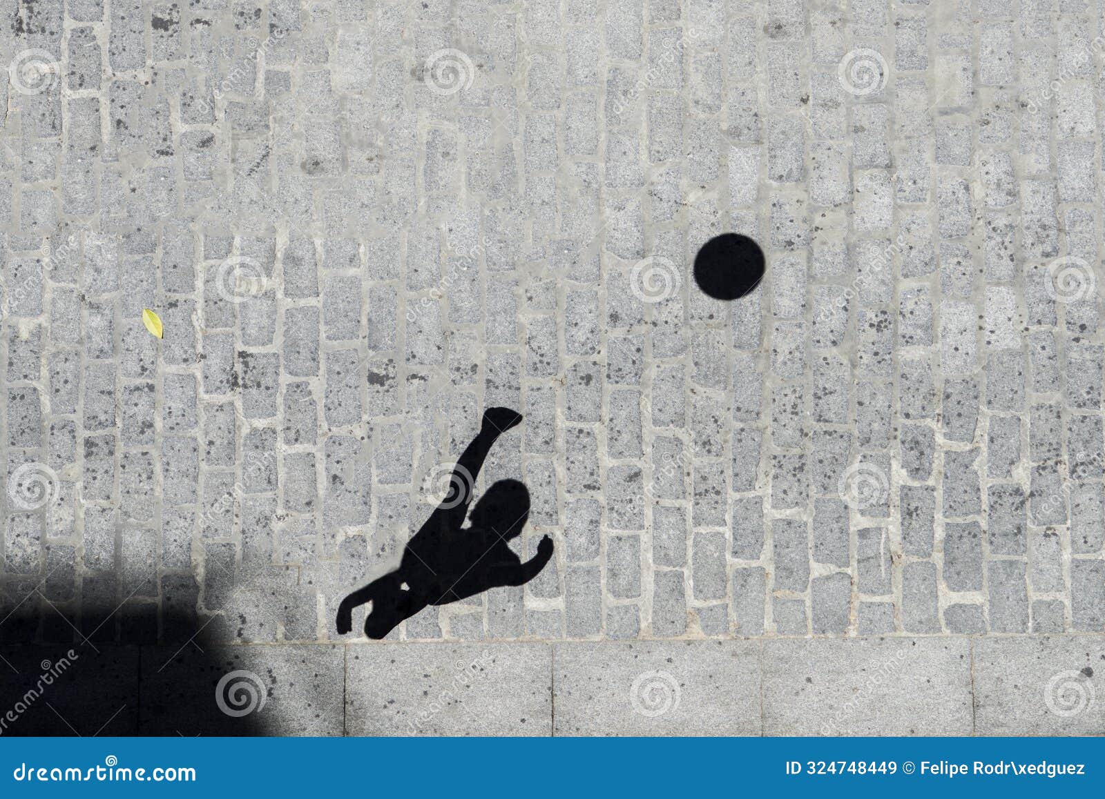 The Shadow of a Kid Kicking a Soccer Ball Stock Image - Image of game ...