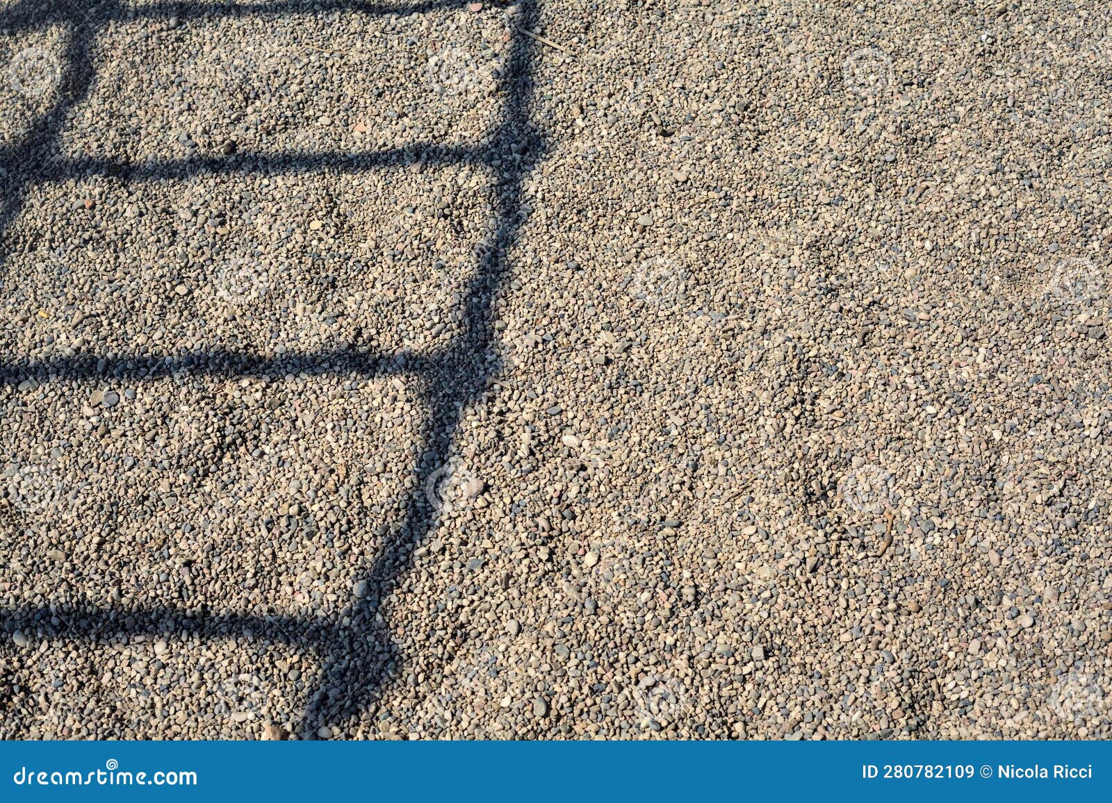 Shadow of a Ladder Casted on Pebbles Stock Image - Image of background ...