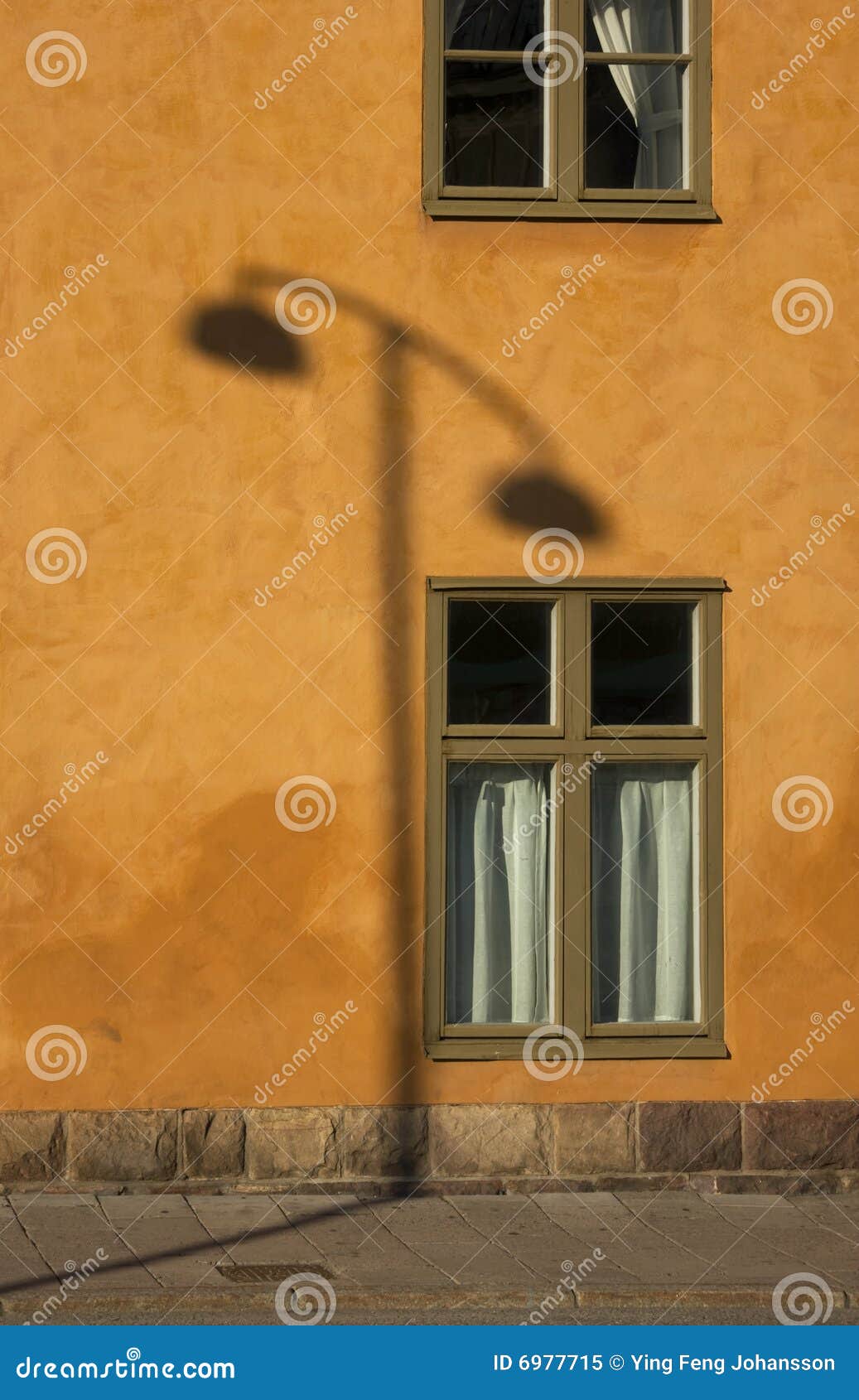 Shadow of a lamp post stock image. Image of town, sweden - 6977715
