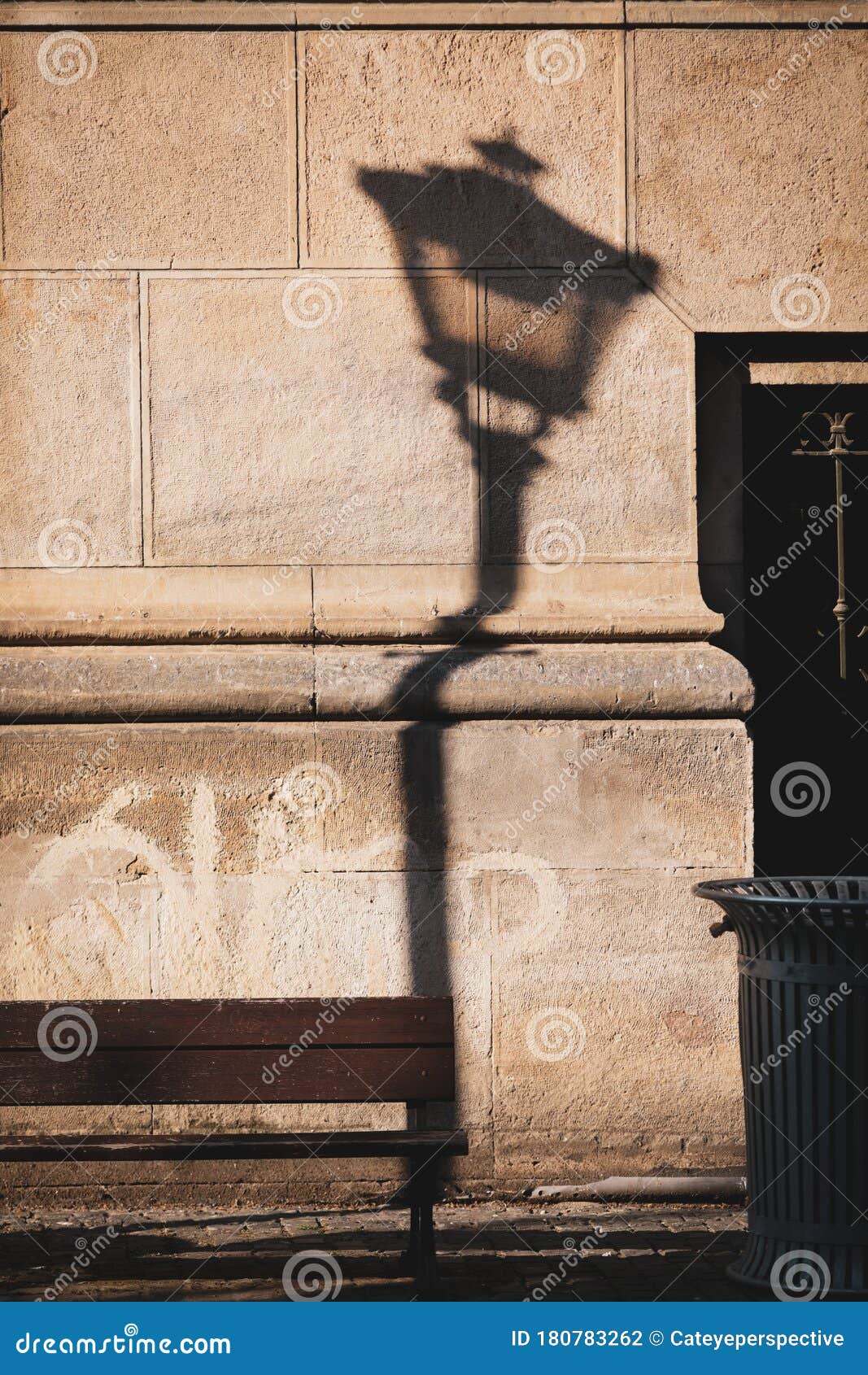 Shadow of a Lamp Post is Casted on the Surface of an Old Building in ...