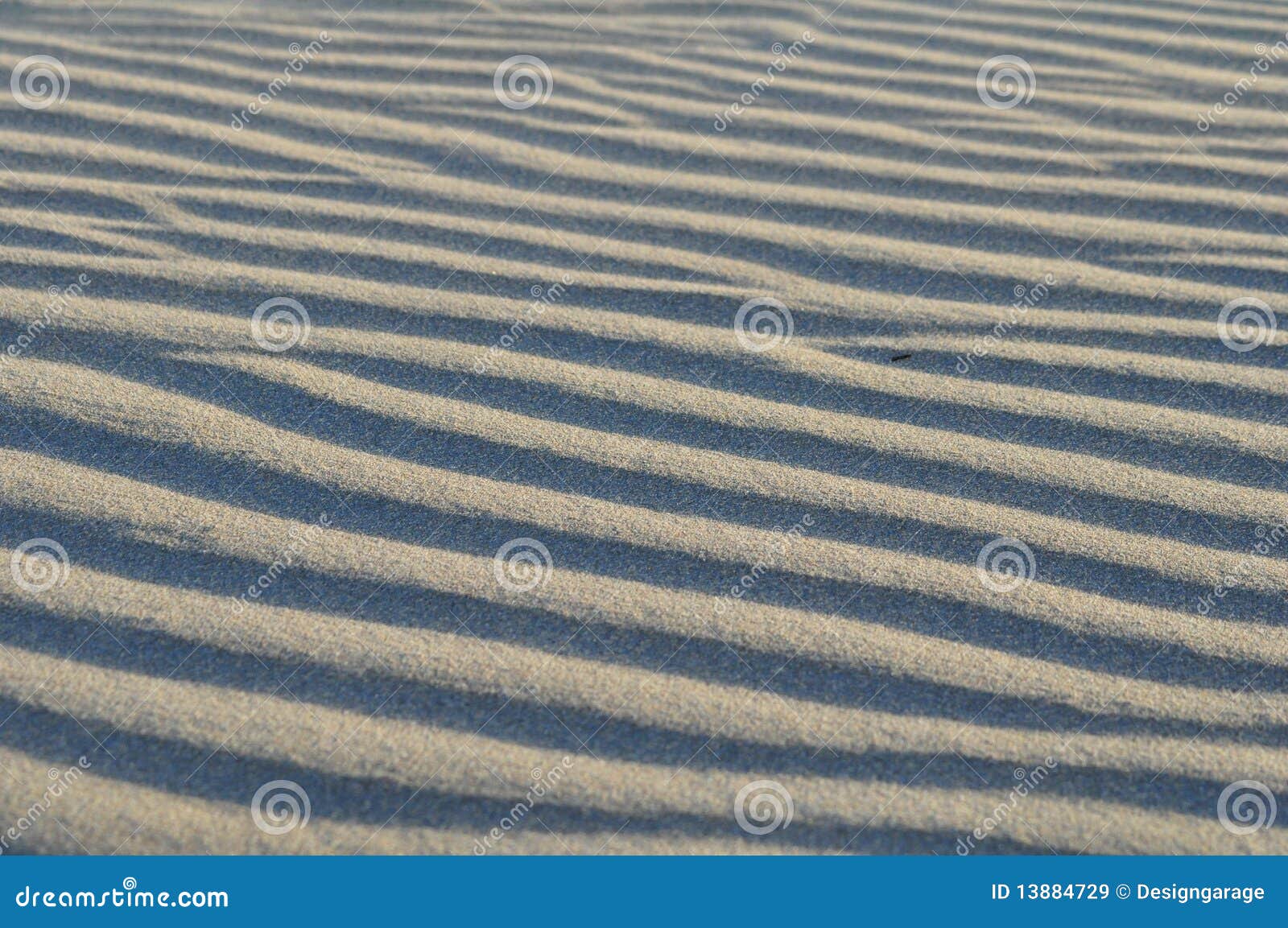 Shadow and light in sand stock image. Image of pattern - 13884729