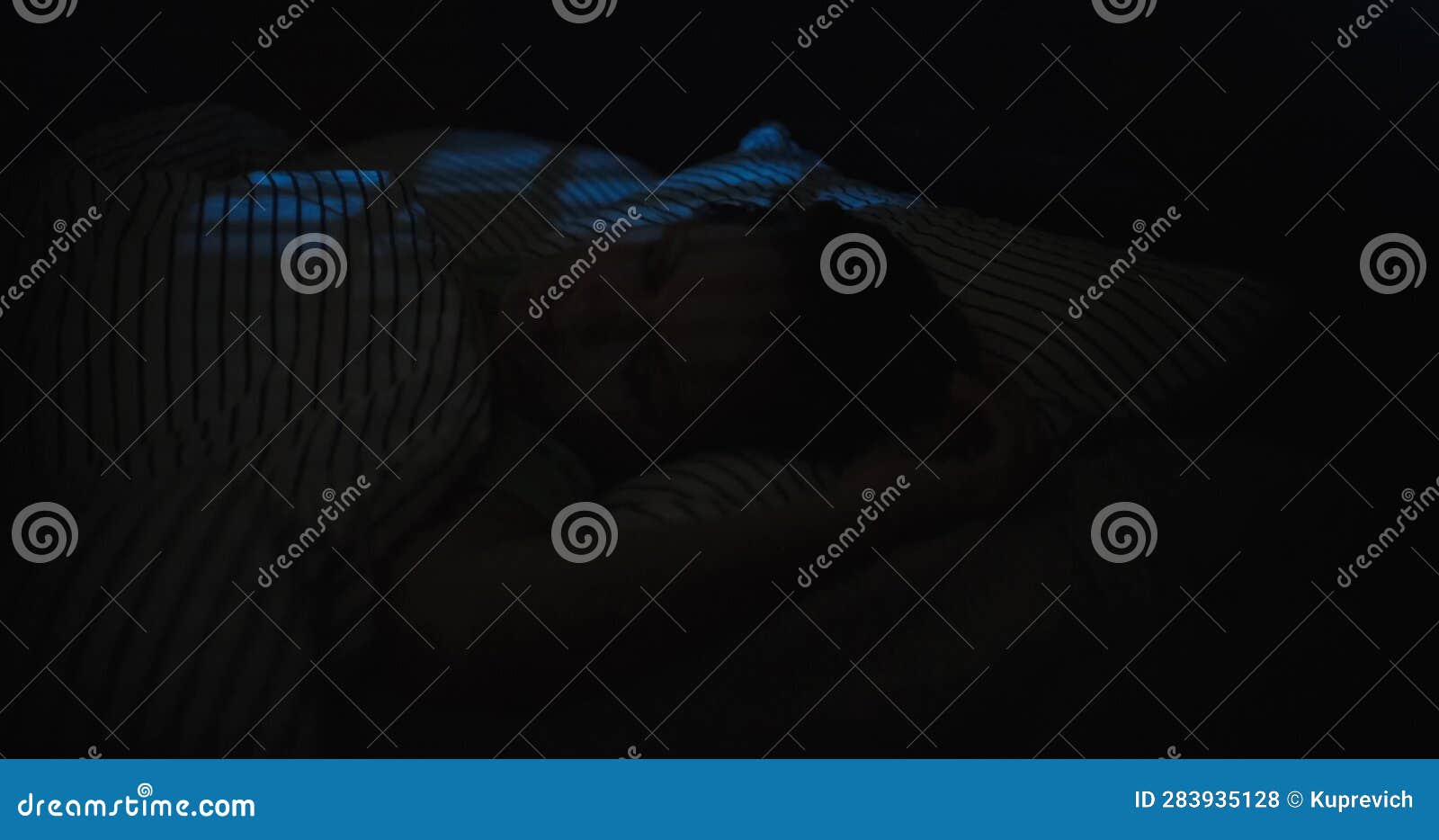 A Shadow from a Lightning Flash on a Sleeping Woman Stock Footage ...