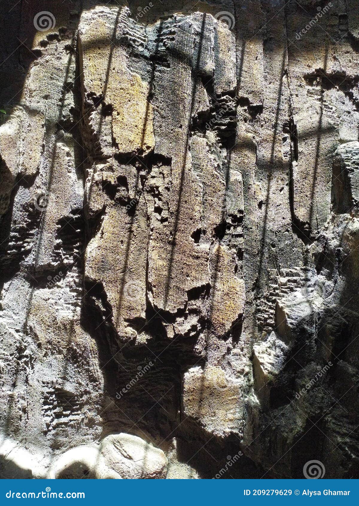 Shadow line on Stone wall stock image. Image of shadow - 209279629