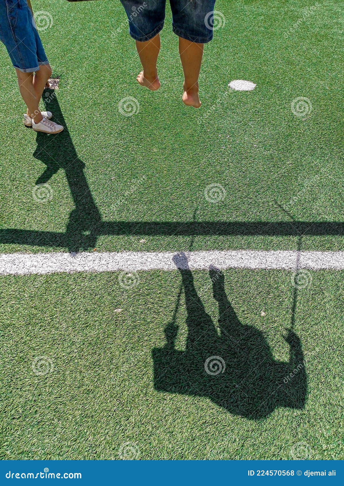 The Shadow of a Little Boy on a Swing Stock Photo - Image of little ...