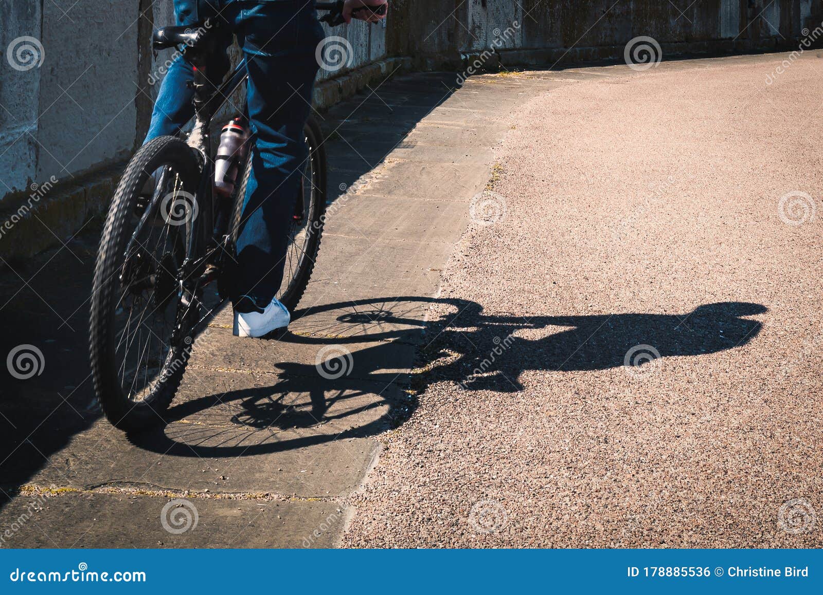 Shadow of a Man on a Bicycle with Copy Space Stock Photo - Image of ...