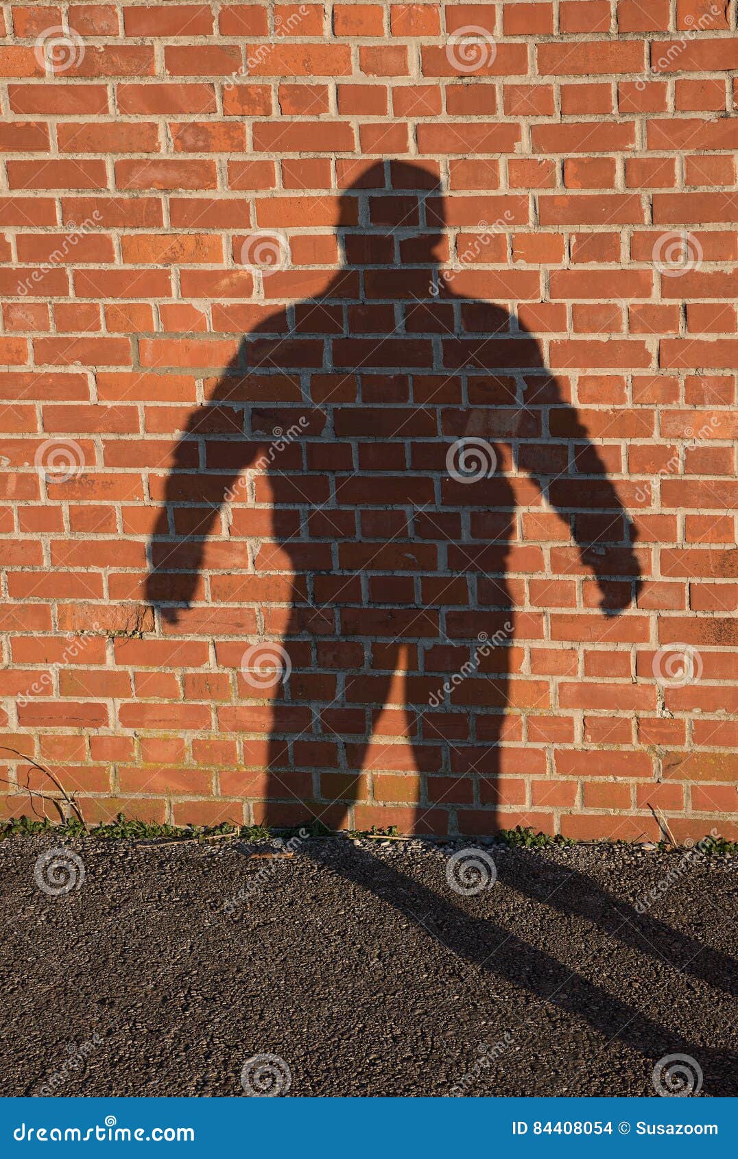 Shadow of a Man on a Brick Wall Stock Photo - Image of stone, shade ...
