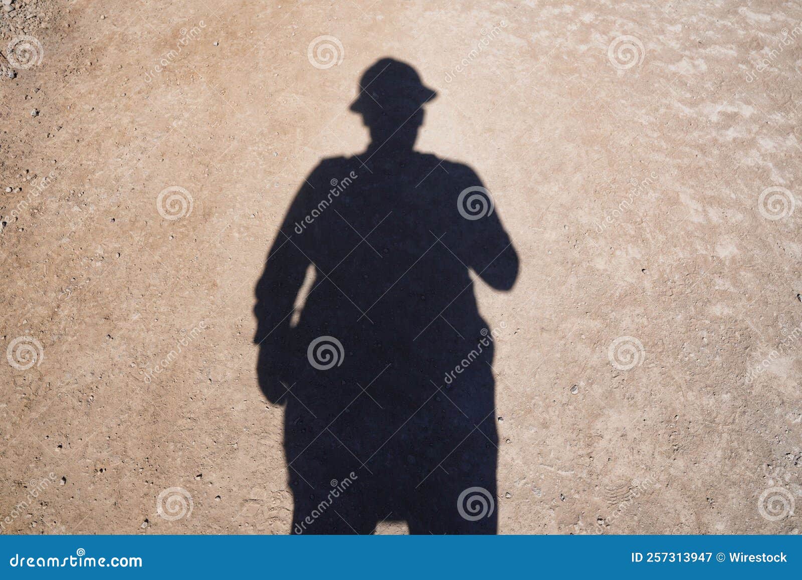 Shadow of a Man on the Ground in an Engineering Hat Stock Image - Image ...
