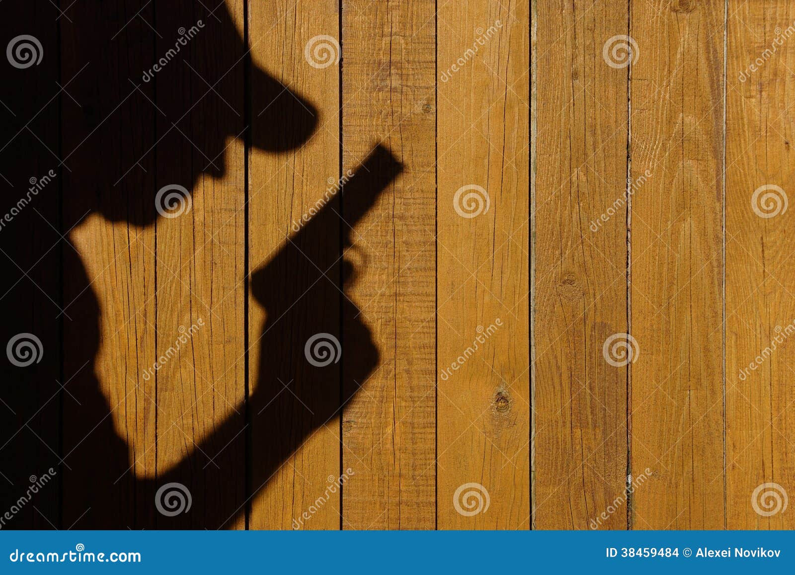 Shadow of a Man with a Gun on a Wooden Fence Stock Photo - Image of ...