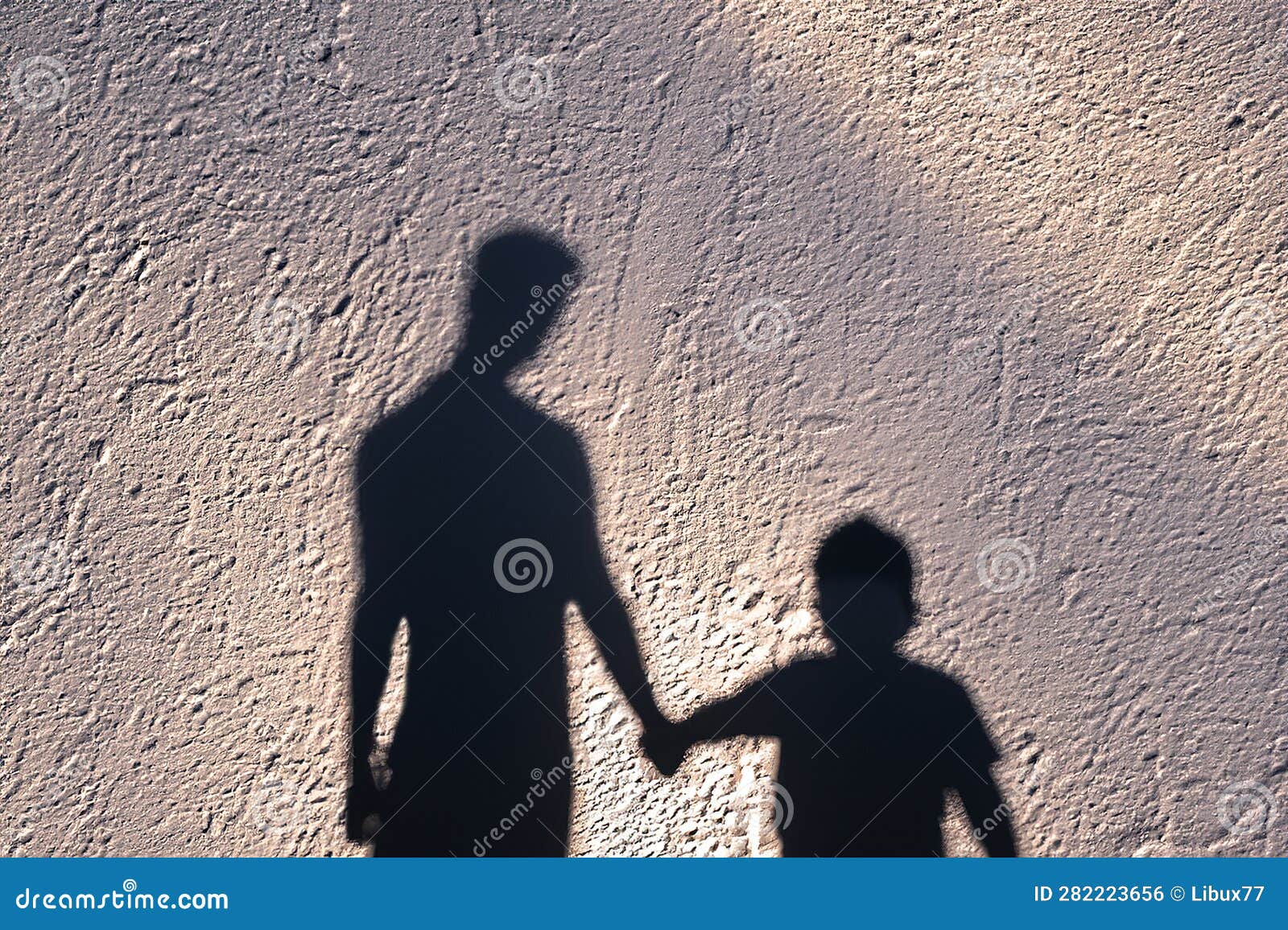 Shadow of a Man and a Kid Hand in Hand Wall Stock Photo - Image of ...