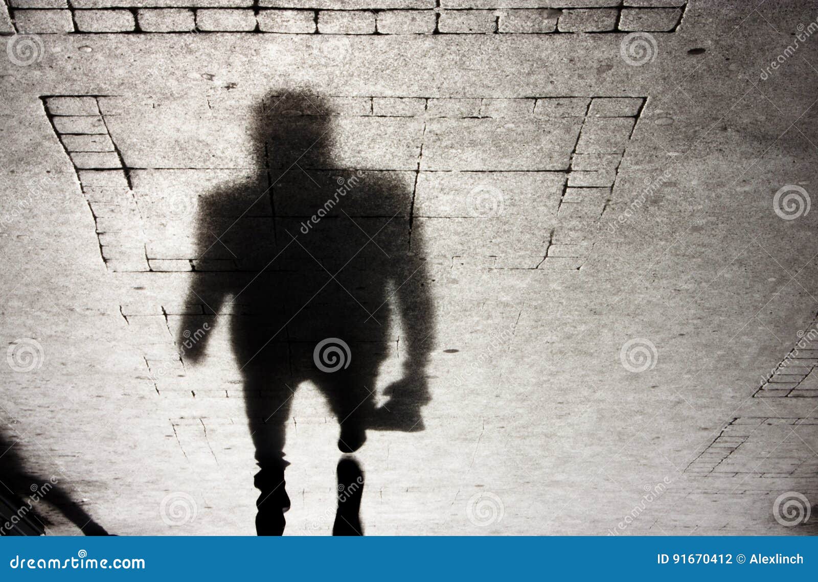 Shadow of a Man on Patterened Sidewalk Stock Photo - Image of human ...