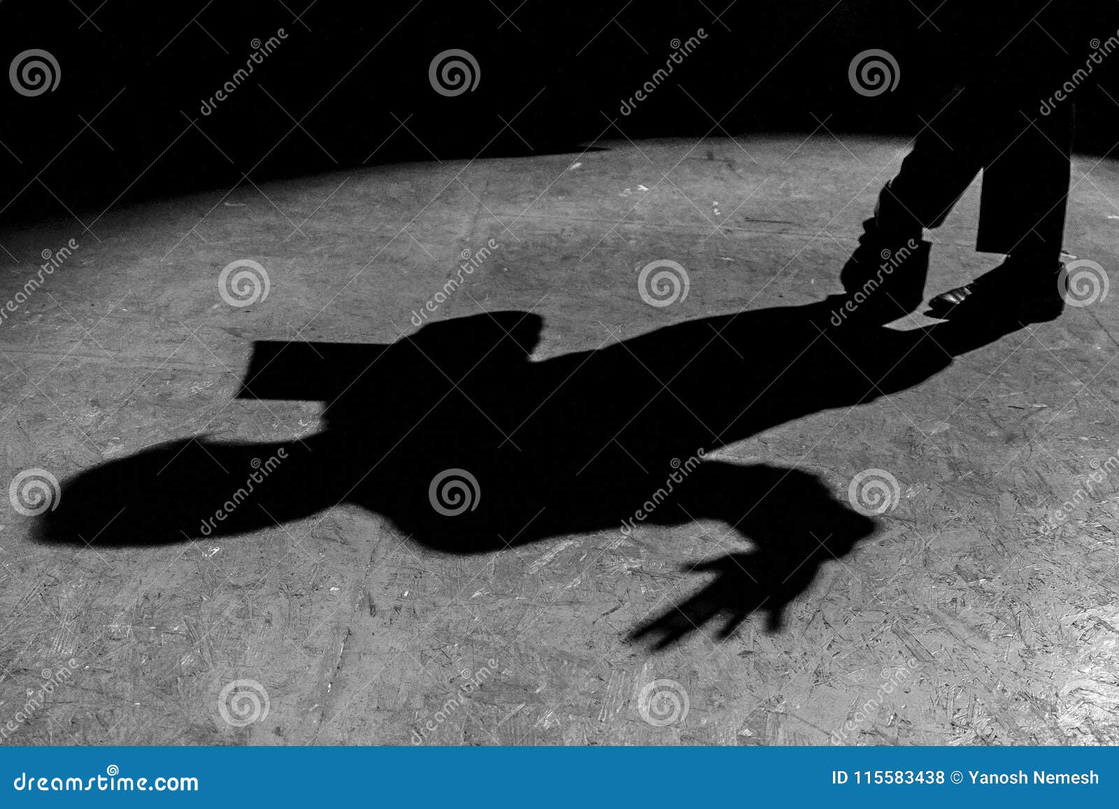 Shadow of a Man Reading a Newspaper Under a Lantern Stock Photo - Image ...