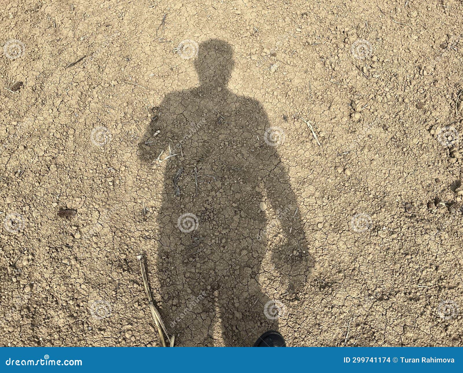Shadow of a Man Standing on the Ground with Shadow of a Man Stock Photo ...