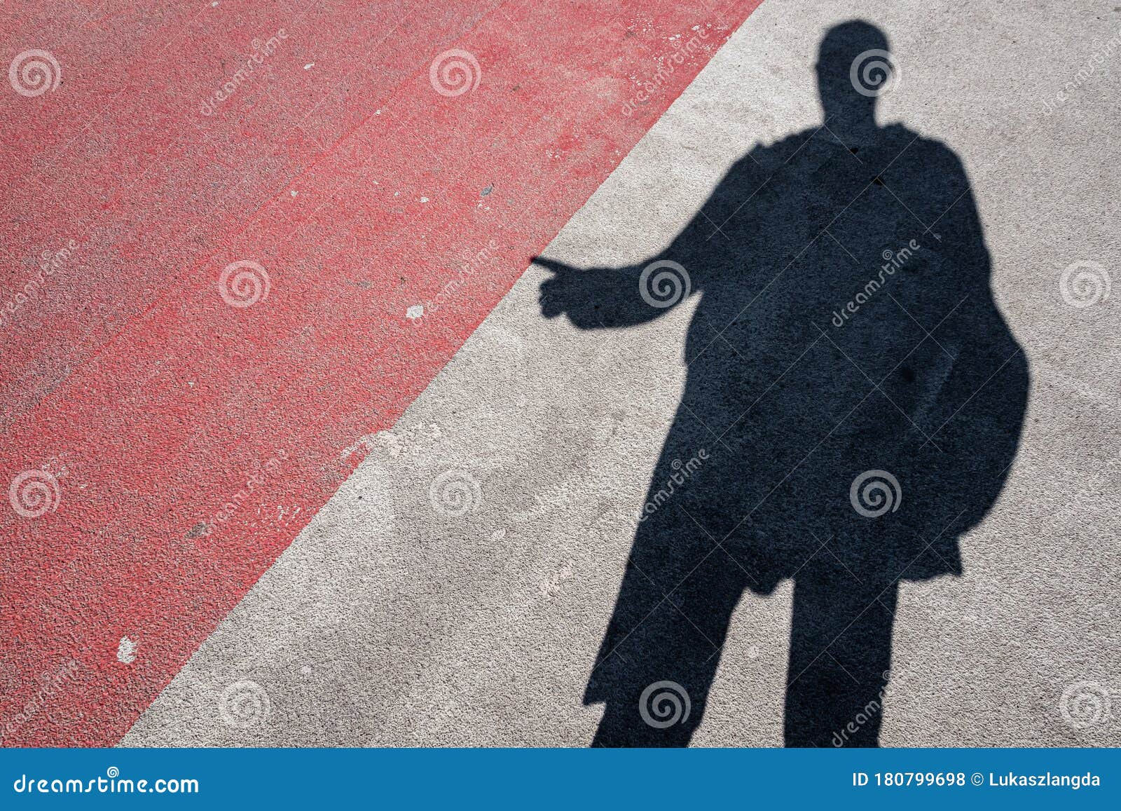 The Shadow of a Man Standing on the Pavement Stock Photo - Image of ...