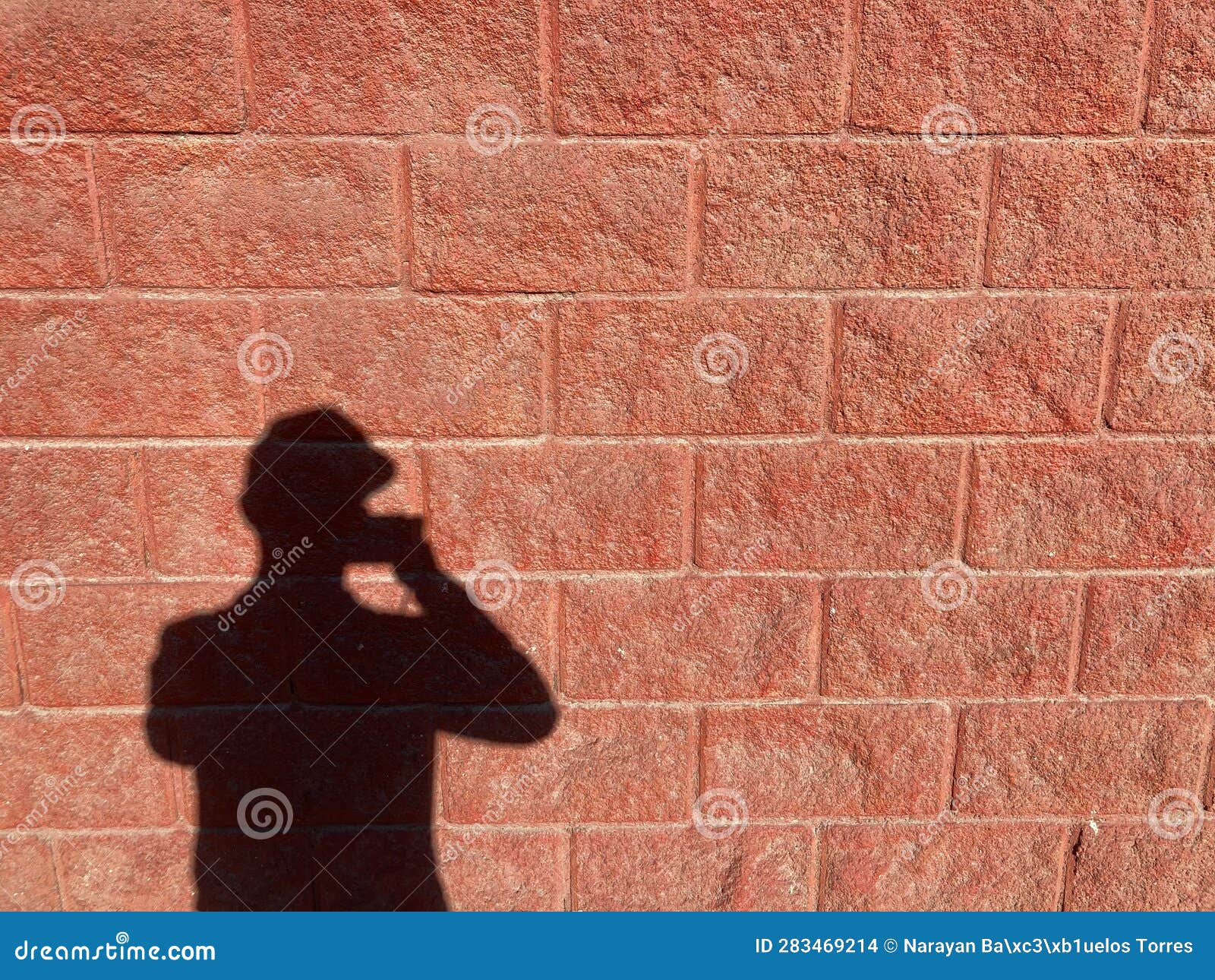 Shadow of Man Taking a Photo with Cell Phone Anonymously, Anonymous ...