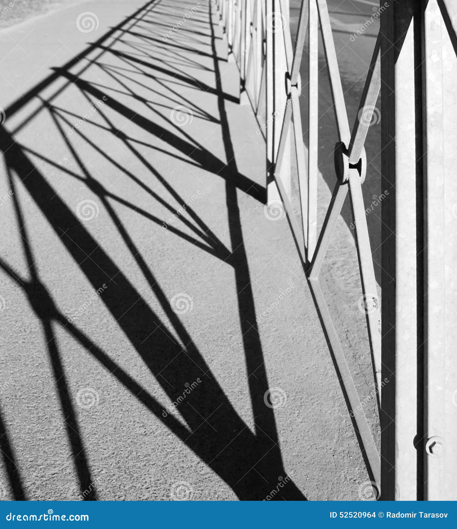 Shadow of the metal fence stock photo. Image of railing - 52520964