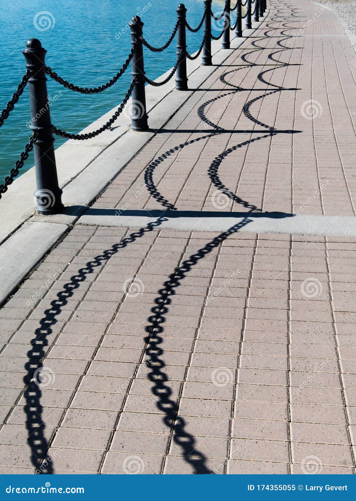 Sidewalk Shadow, Chain Barrier Stock Image - Image of alone, alley ...