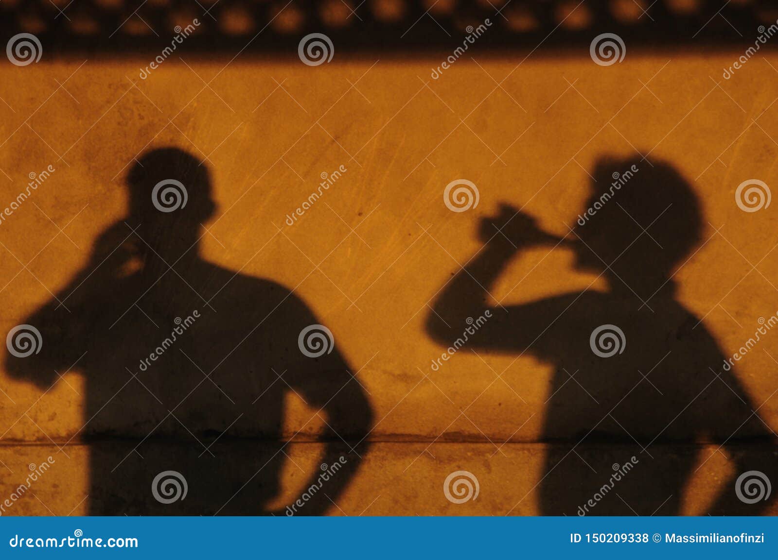 Shadow of People Drinking on a Yellow Wall. Stock Photo - Image of ...