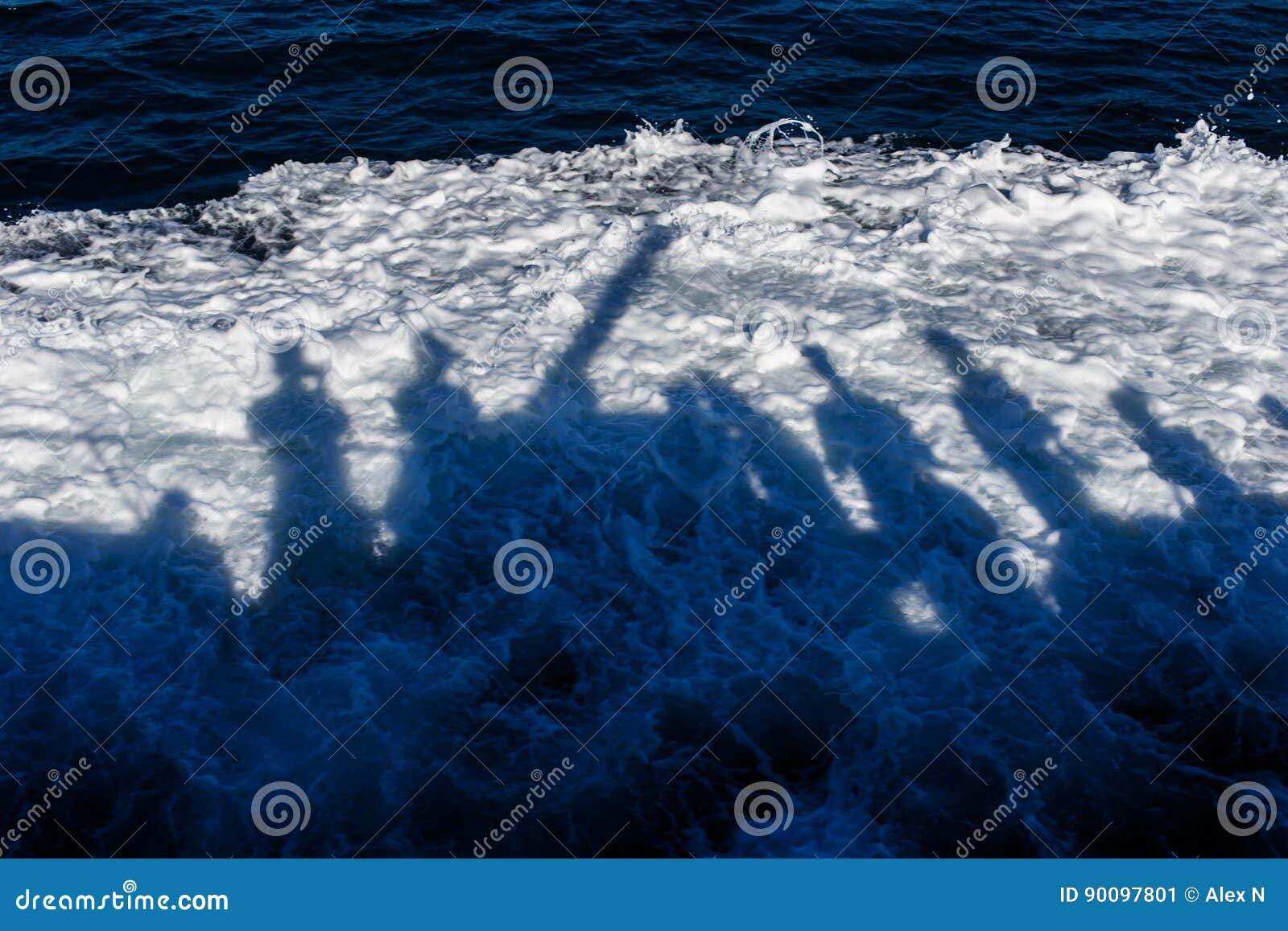 Shadow of people on sea stock image. Image of background - 90097801