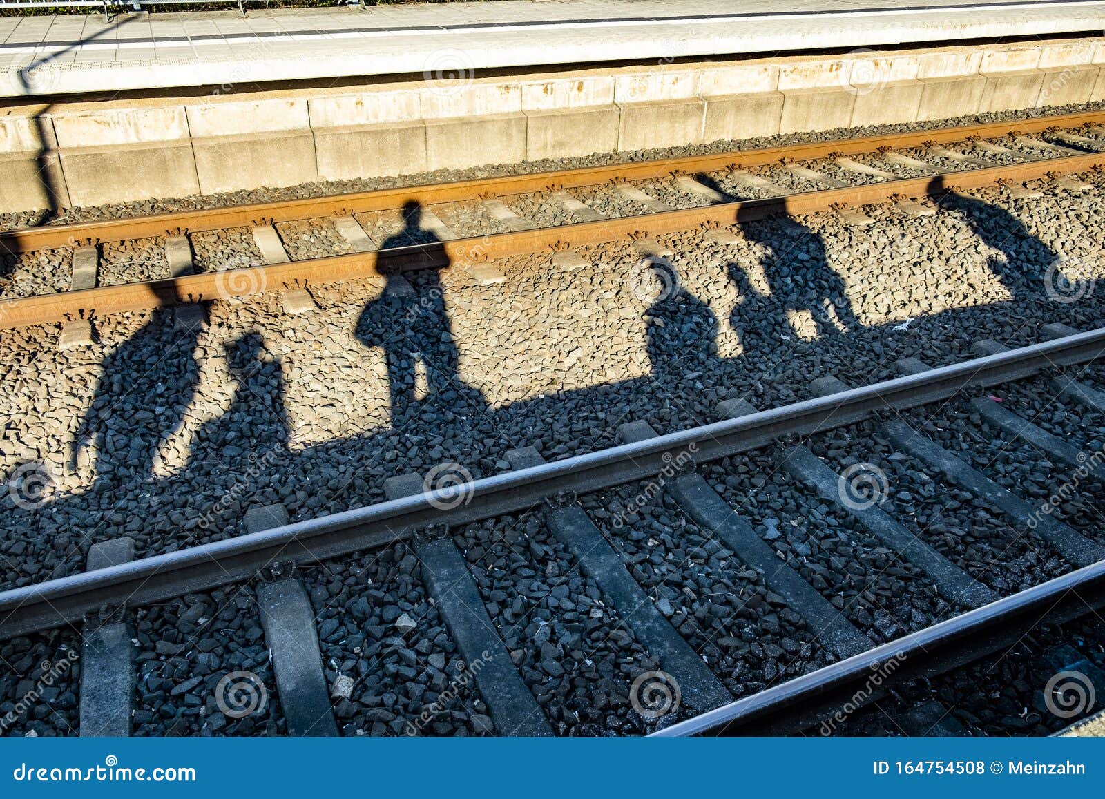 Shadow of People Waiting for the Train Stock Photo - Image of rails ...
