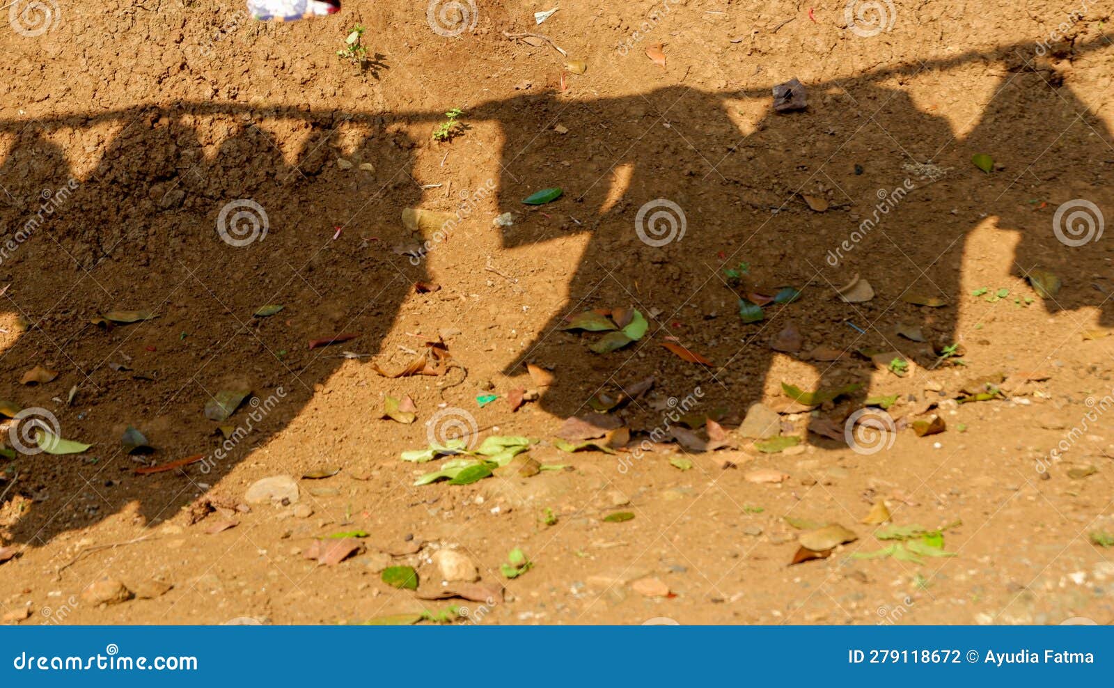A Shadow Photo of a Clothes Drying in the Sun Stock Photo - Image of ...
