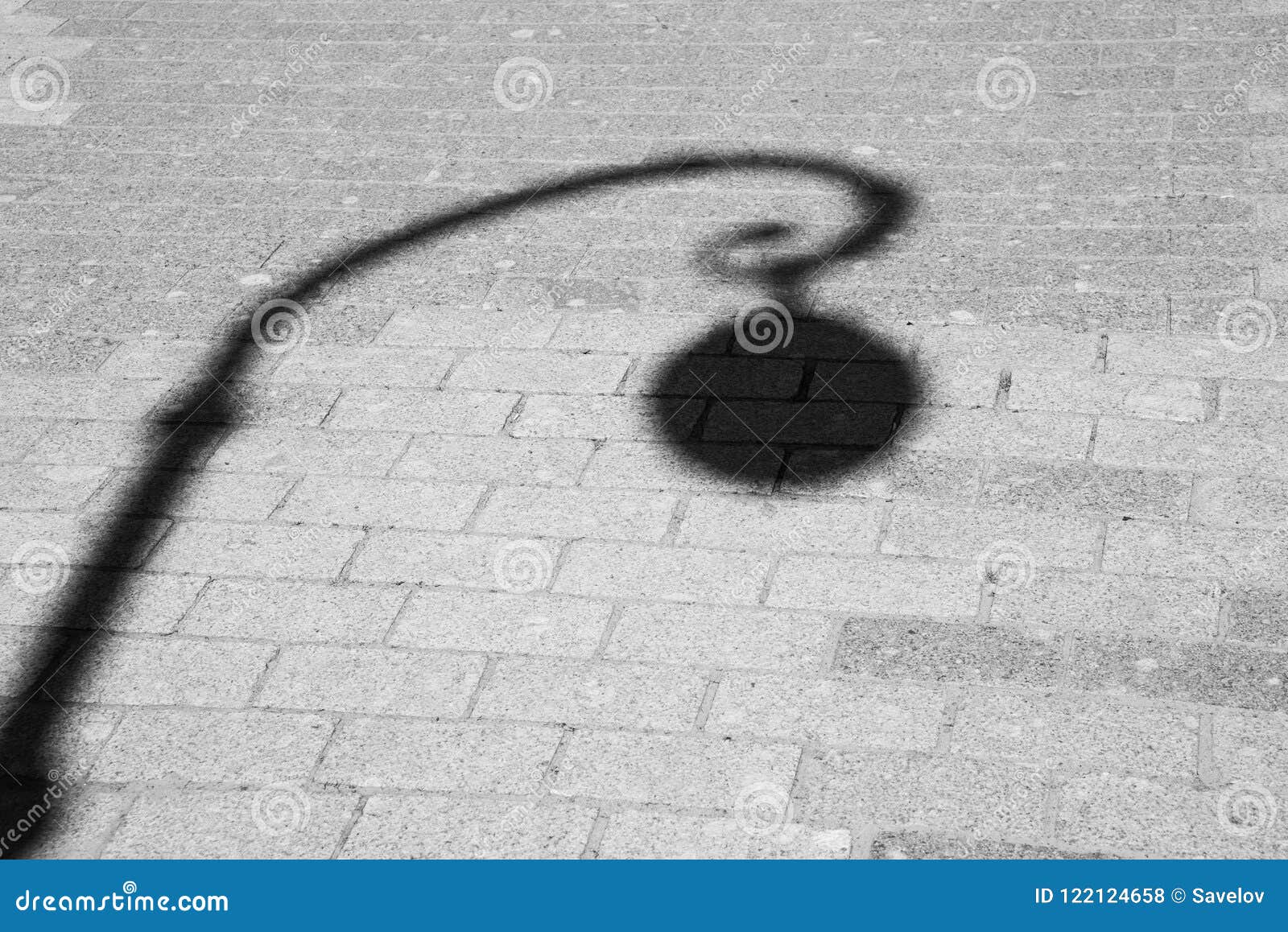 Shadow from a Pillar with a Lantern is on the Paving Stone Stock Photo ...