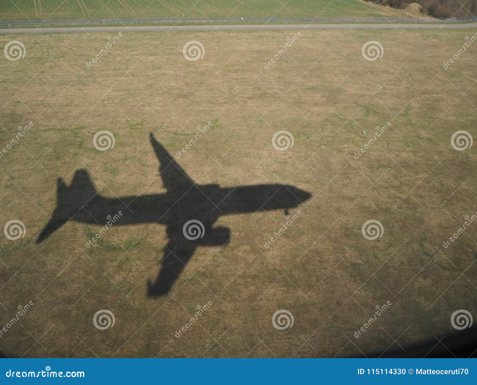 Shadow of the Plane in the Fields during the Landing Stock Photo ...