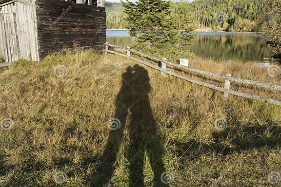 Shadow play of lovers stock image. Image of water, shadow - 83408595
