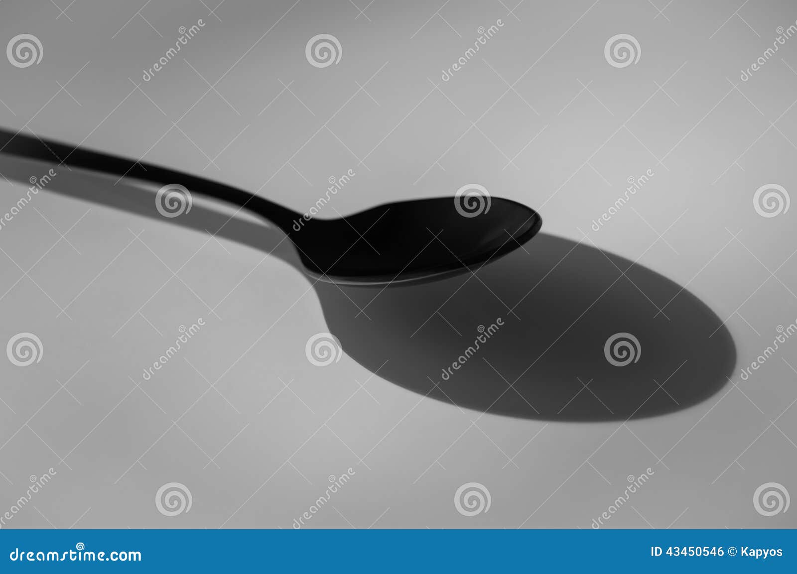 Shadow Projected on a Plane of a Spoon Stock Photo - Image of light ...