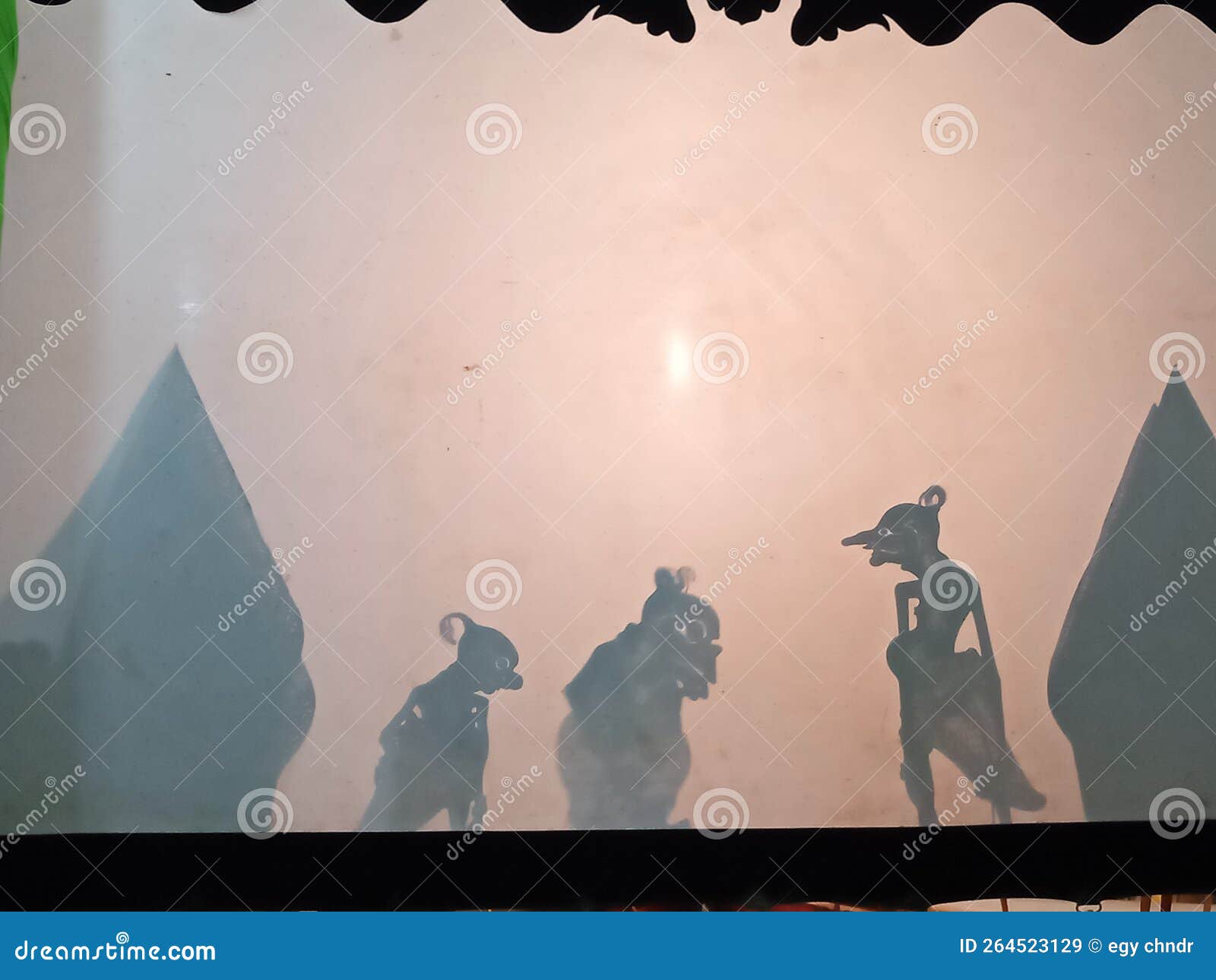 Shadow Puppets over java stock image. Image of mural - 264523129