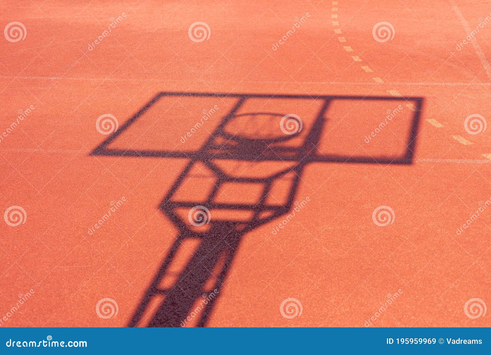 Shadow of the Rack with a Shield and Basketball Ring during Sunny Day ...